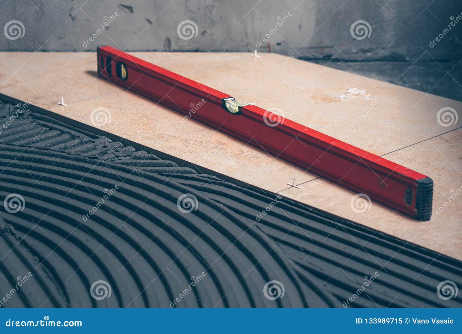 Building Level on Floor Tiles Stock Image - Image of building, flooring ...