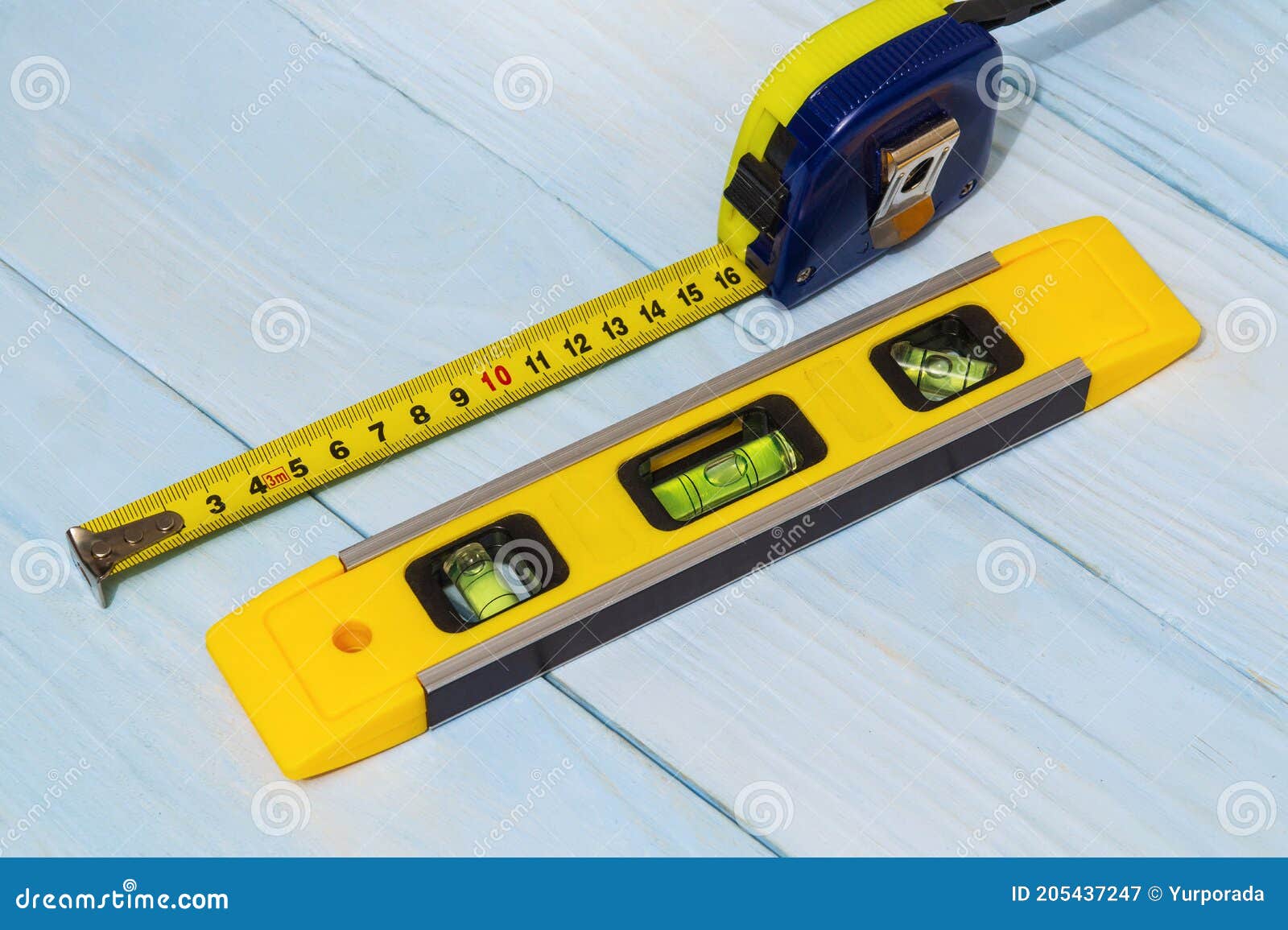Building Level and Tape Measure for Leveling or Measuring Objects on ...