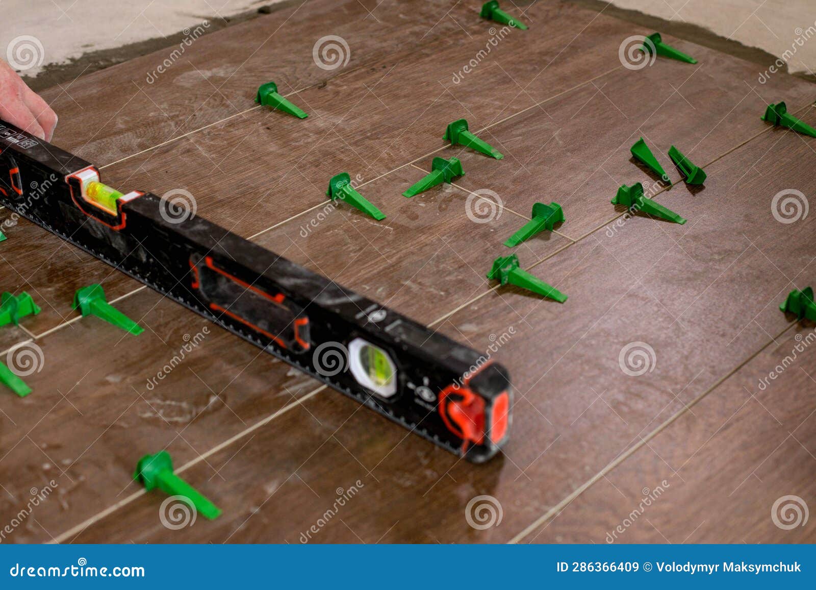 Building Level and Tile Clips for Lying on the Floor Stock Image ...