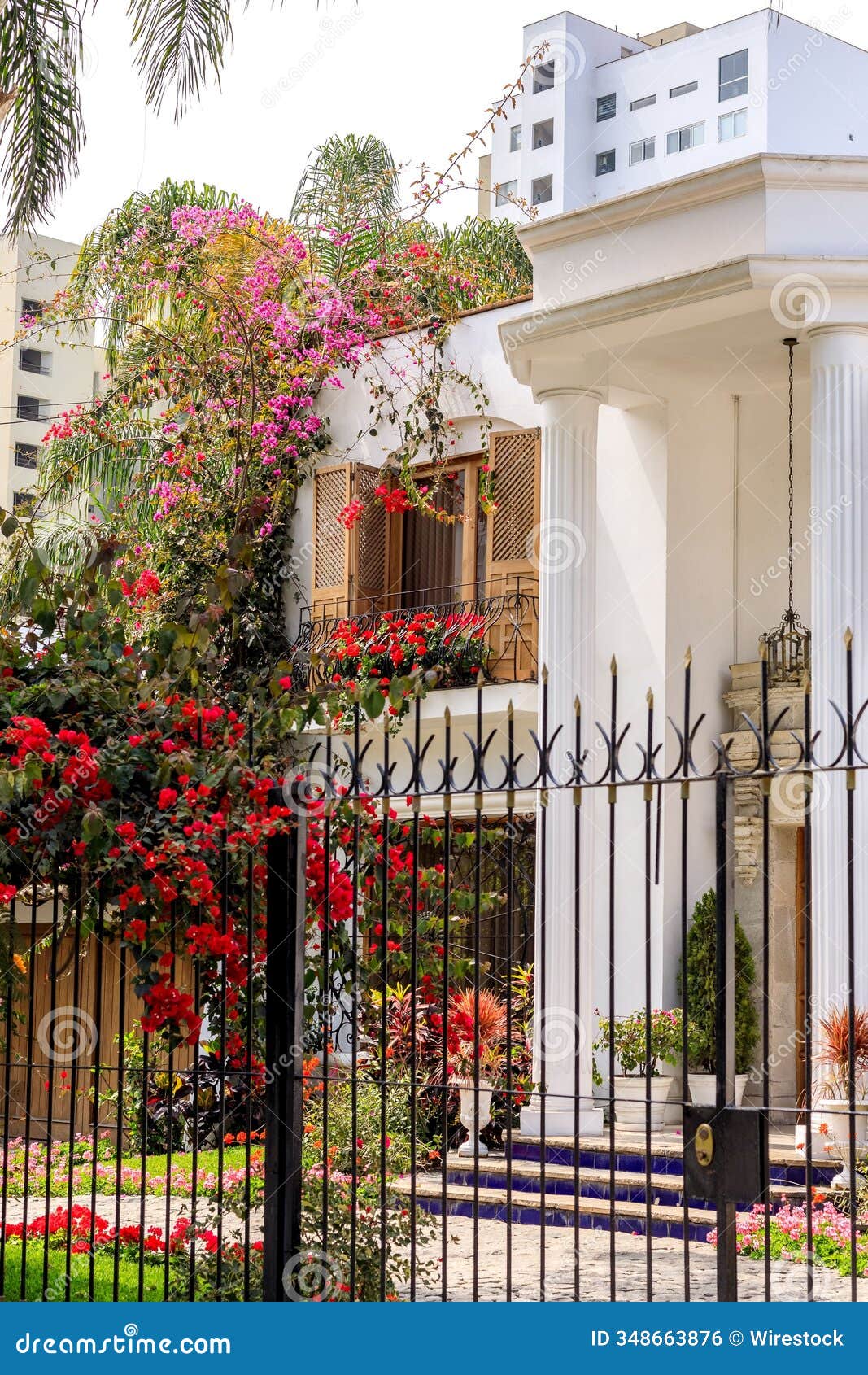 Building with Lush Greenery and Vibrant Flowers in Peru Editorial Photo ...