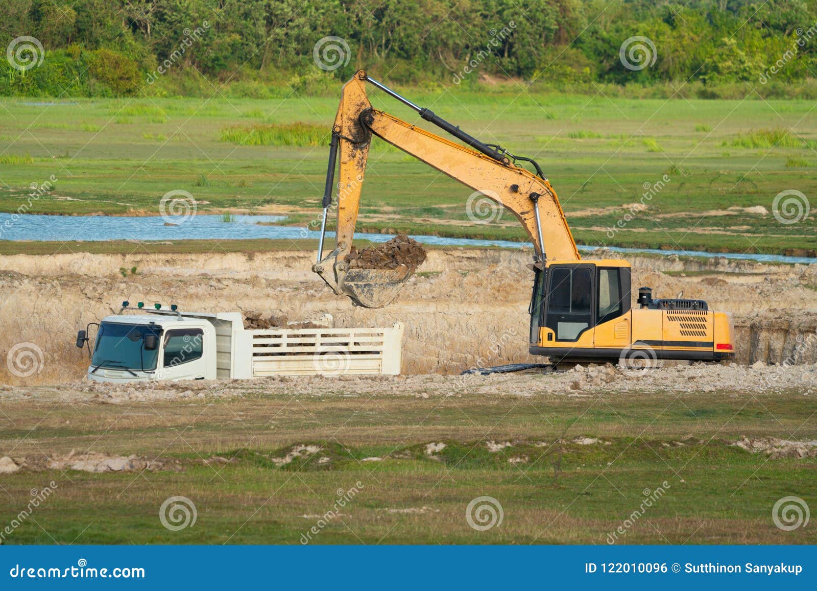 Building Machines: Digger Loading Trucks with Soil Stock Photo - Image ... Building Machines: Digger Loading Trucks with Soil Stock Photo - Image ...