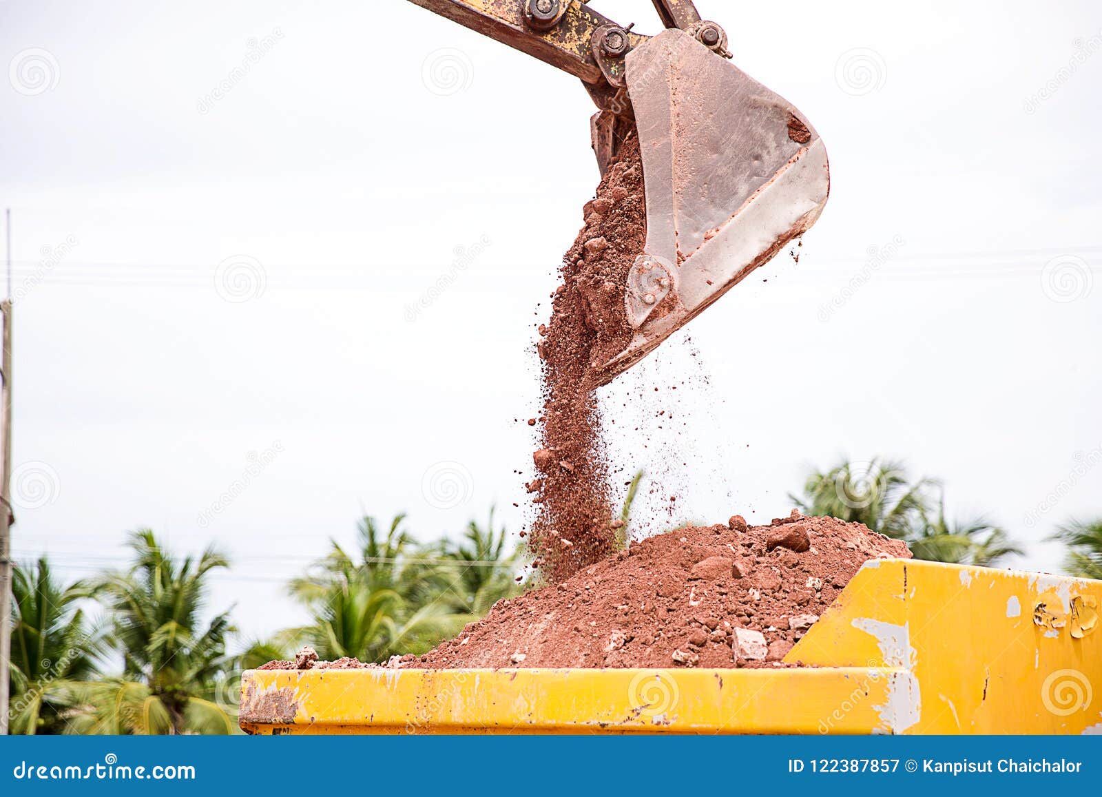 Building Machines: Digger Loading Trucks with Soil. Excavator Loading ...