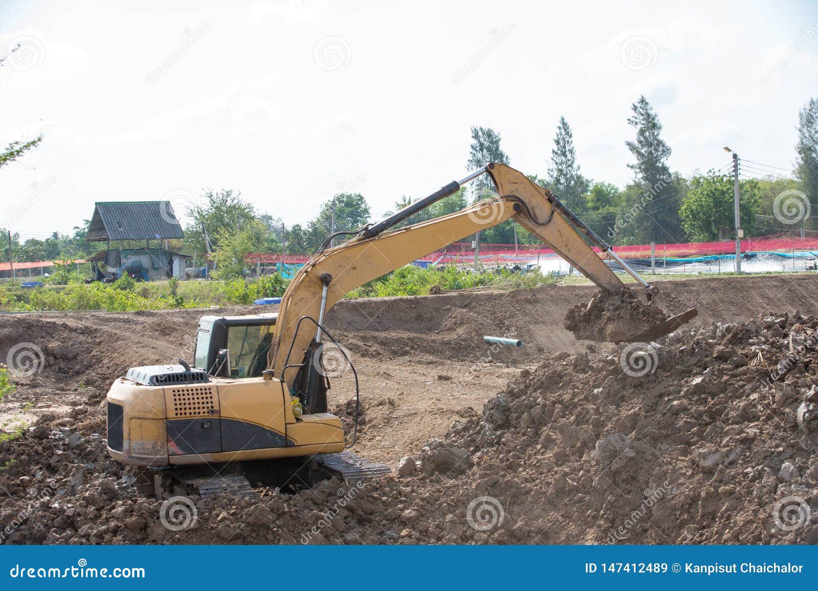 Building Machines: Digger Loading Trucks with Soil. Excavator Loading ...