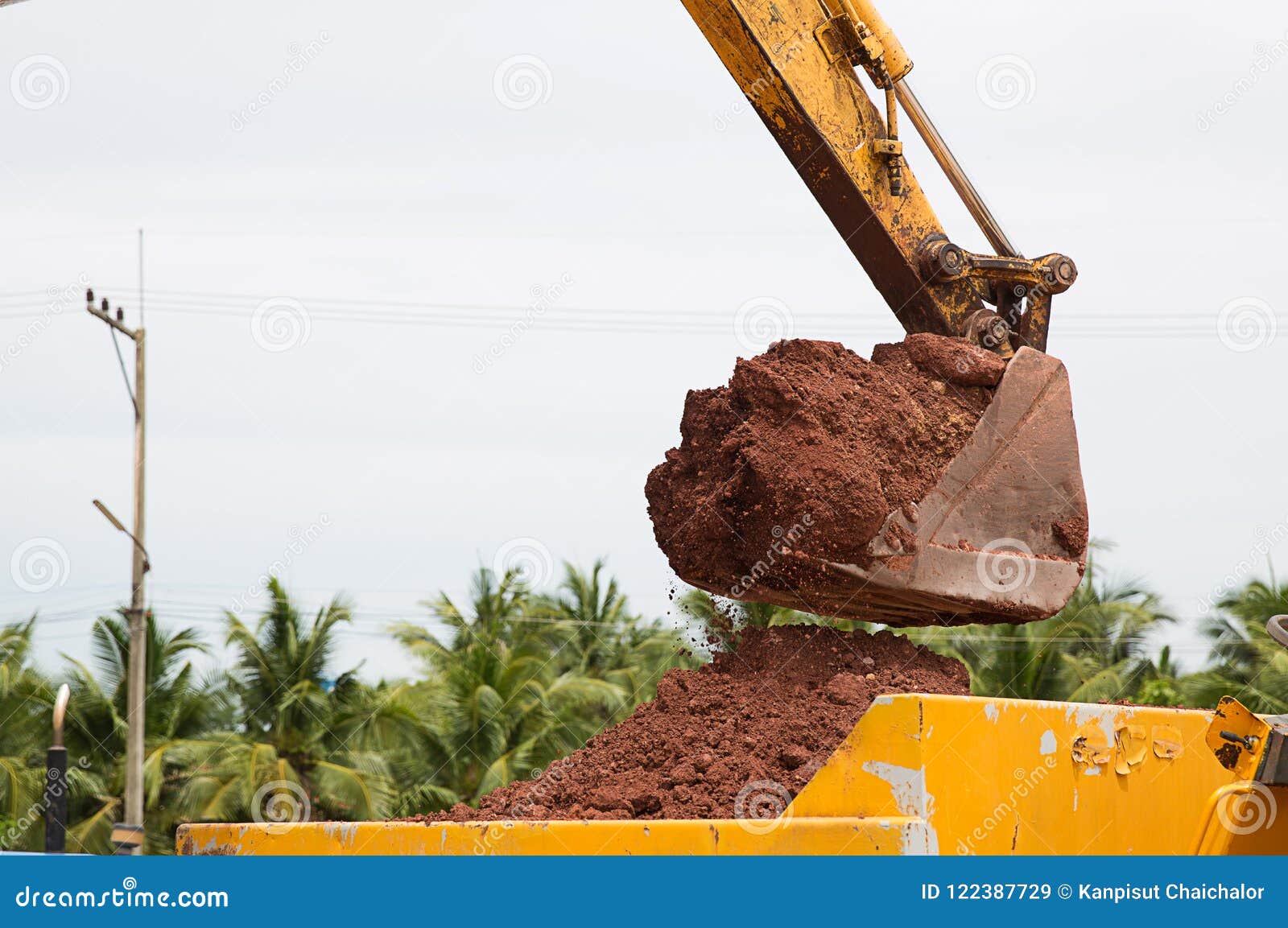 Building Machines: Digger Loading Trucks With Soil. Excavator Loading ... Building Machines: Digger Loading Trucks With Soil. Excavator Loading ...