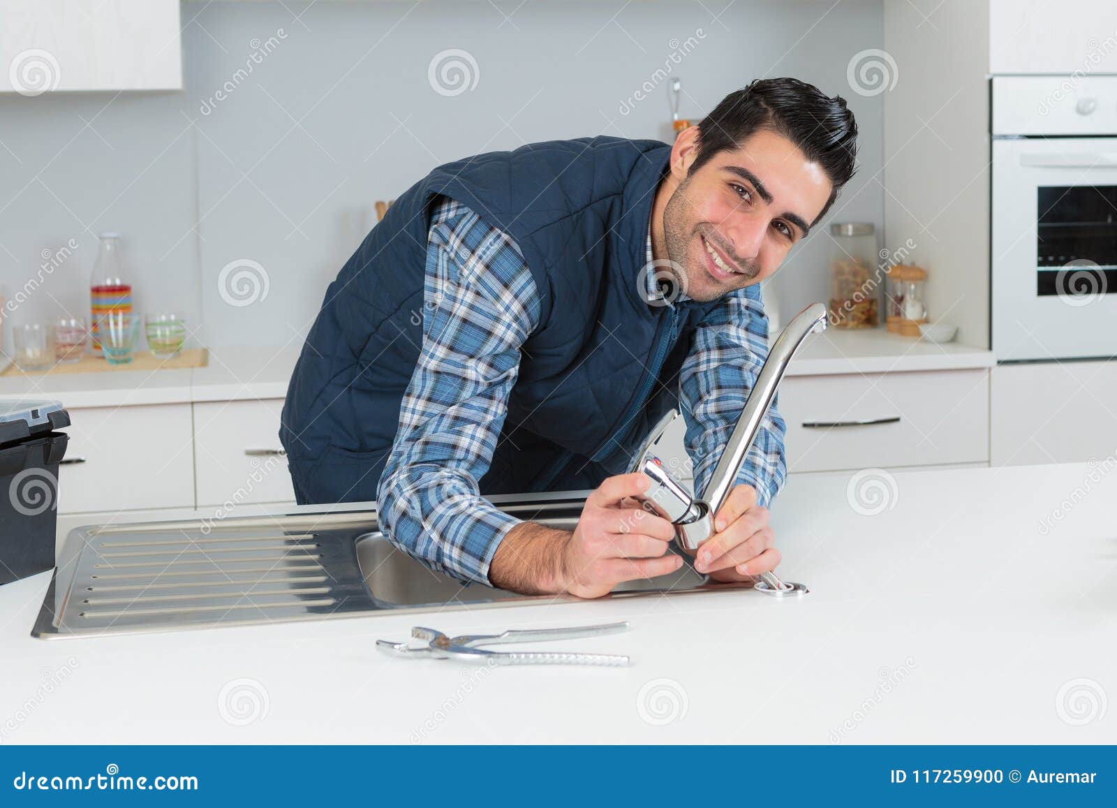 The Building Maintenance Man Stock Photo - Image of defective, pose ...