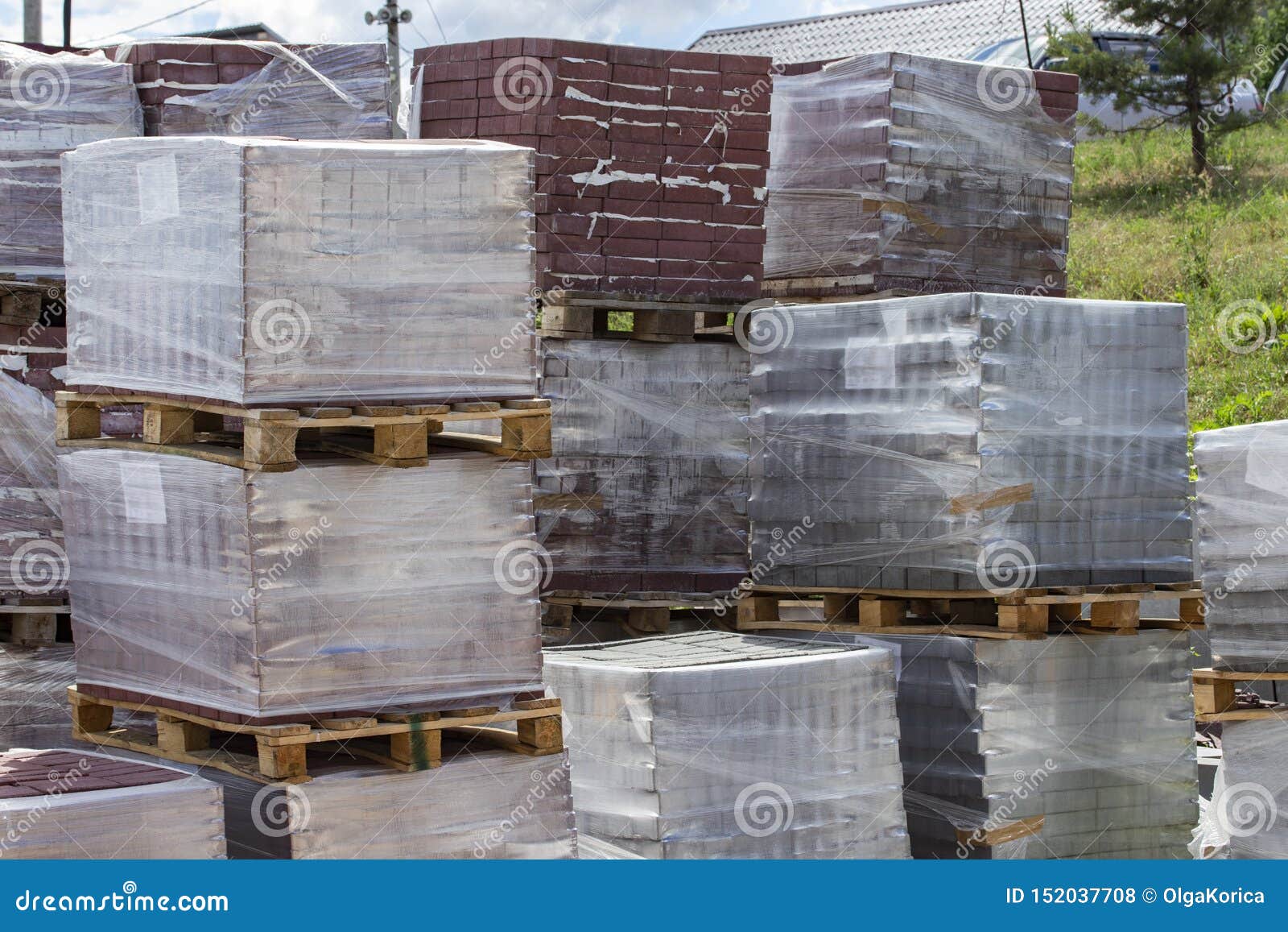 Building Materials on Pallets, Red Bricks Paving Stone. Warehouse ...