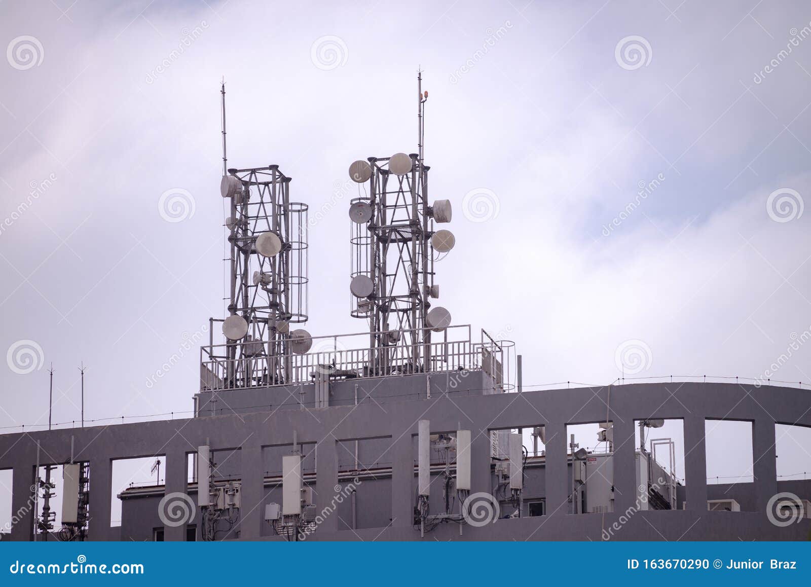 Building with Mobile Cellular Network and Microwave Antenna Stock Photo ...