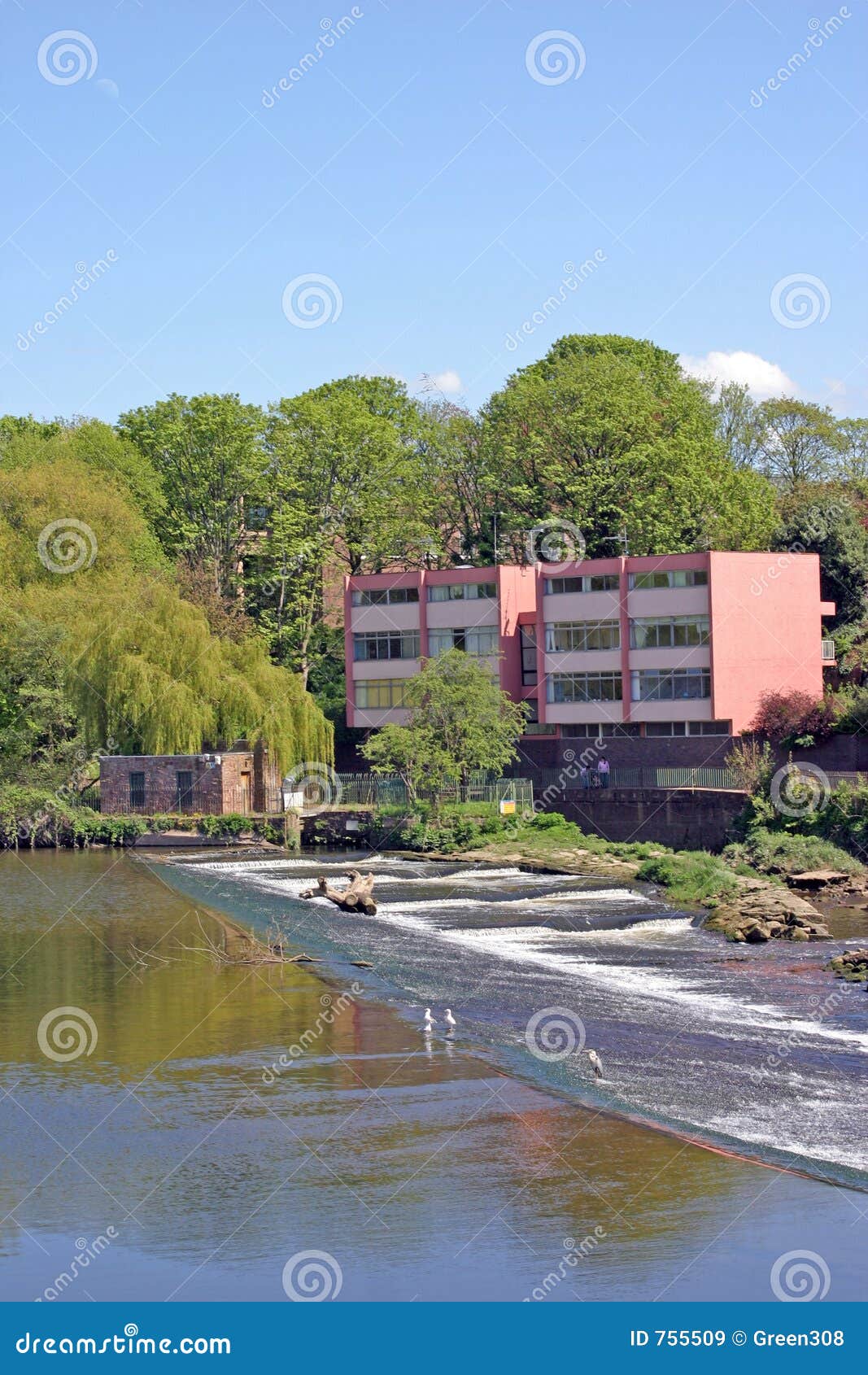 Building near river dam stock image. Image of english, flowing - 755509