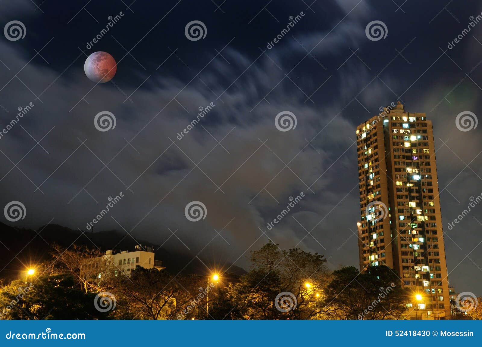 Building Neon moon eclipse stock photo. Image of cloud - 52418430