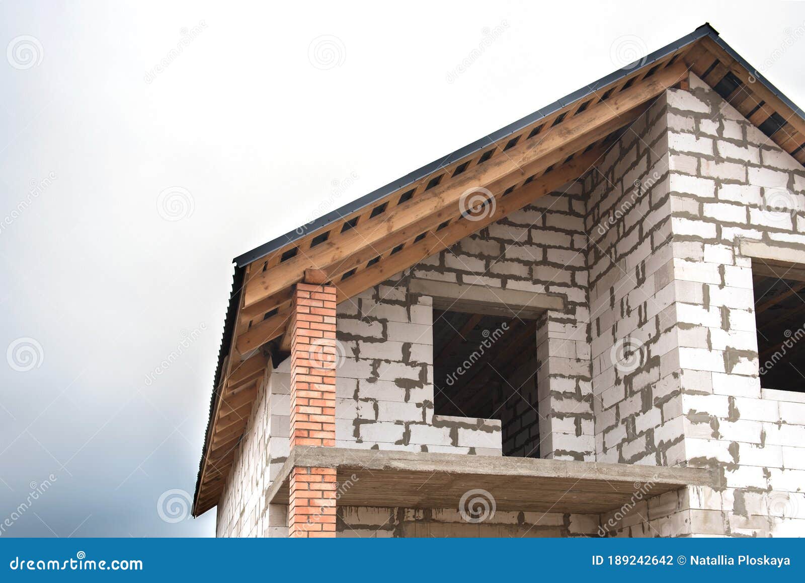 Building a New House of Blocks. Roof Construction Stock Photo - Image ...