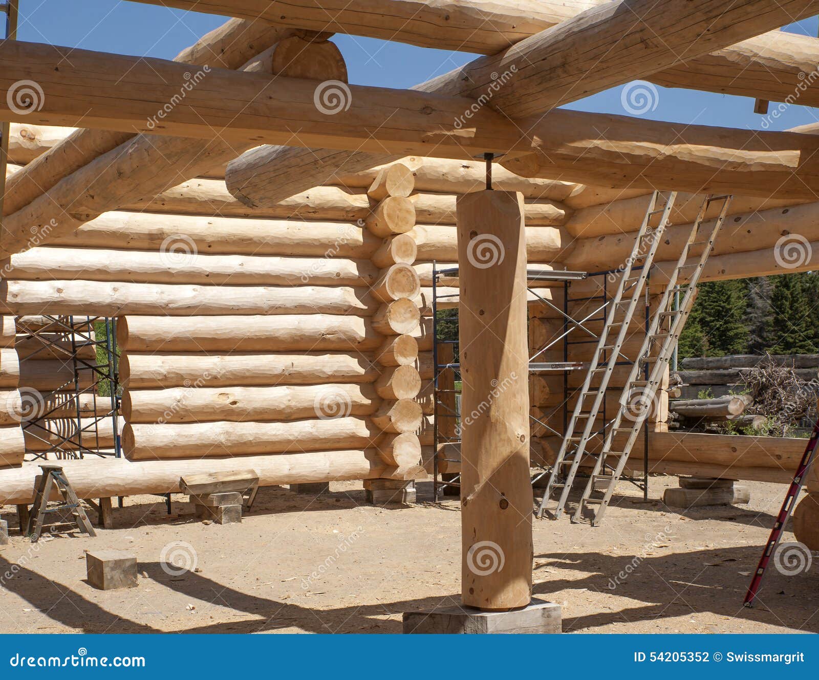 Building a new Log Home stock photo. Image of pattern - 54205352