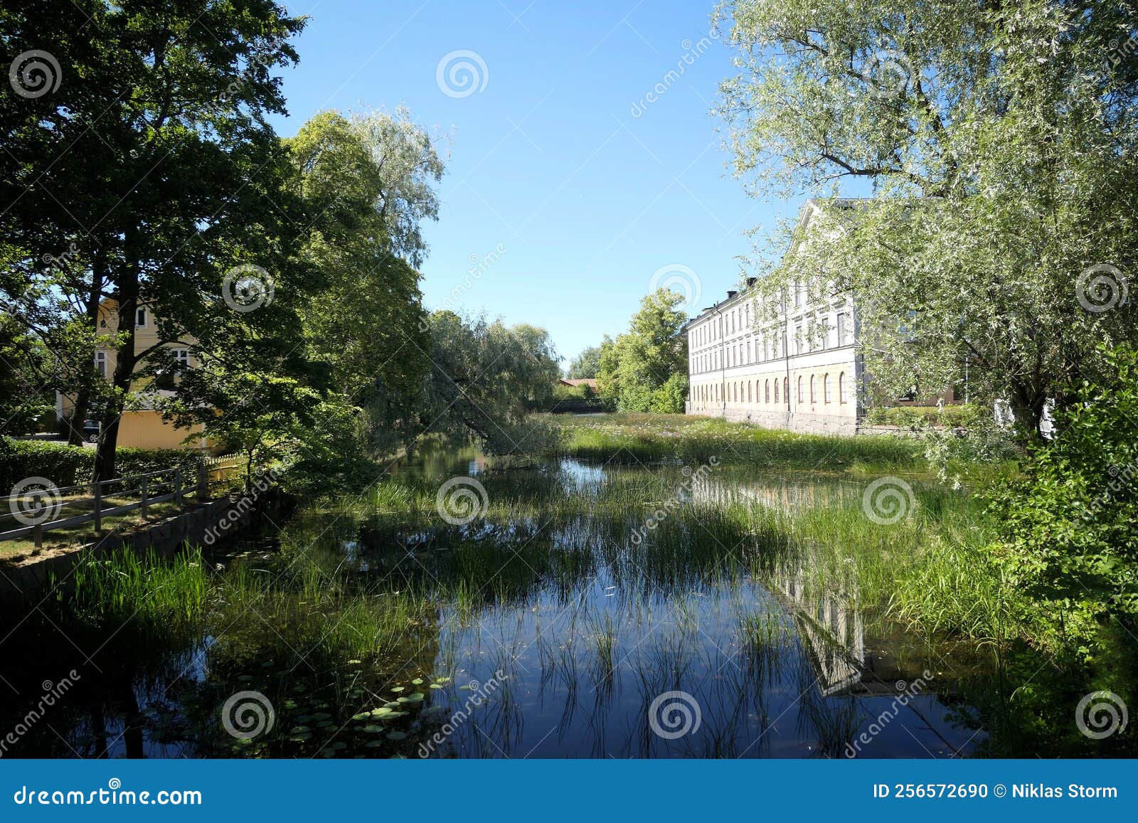 Building Next To River during Summer Stock Photo - Image of waterway ...