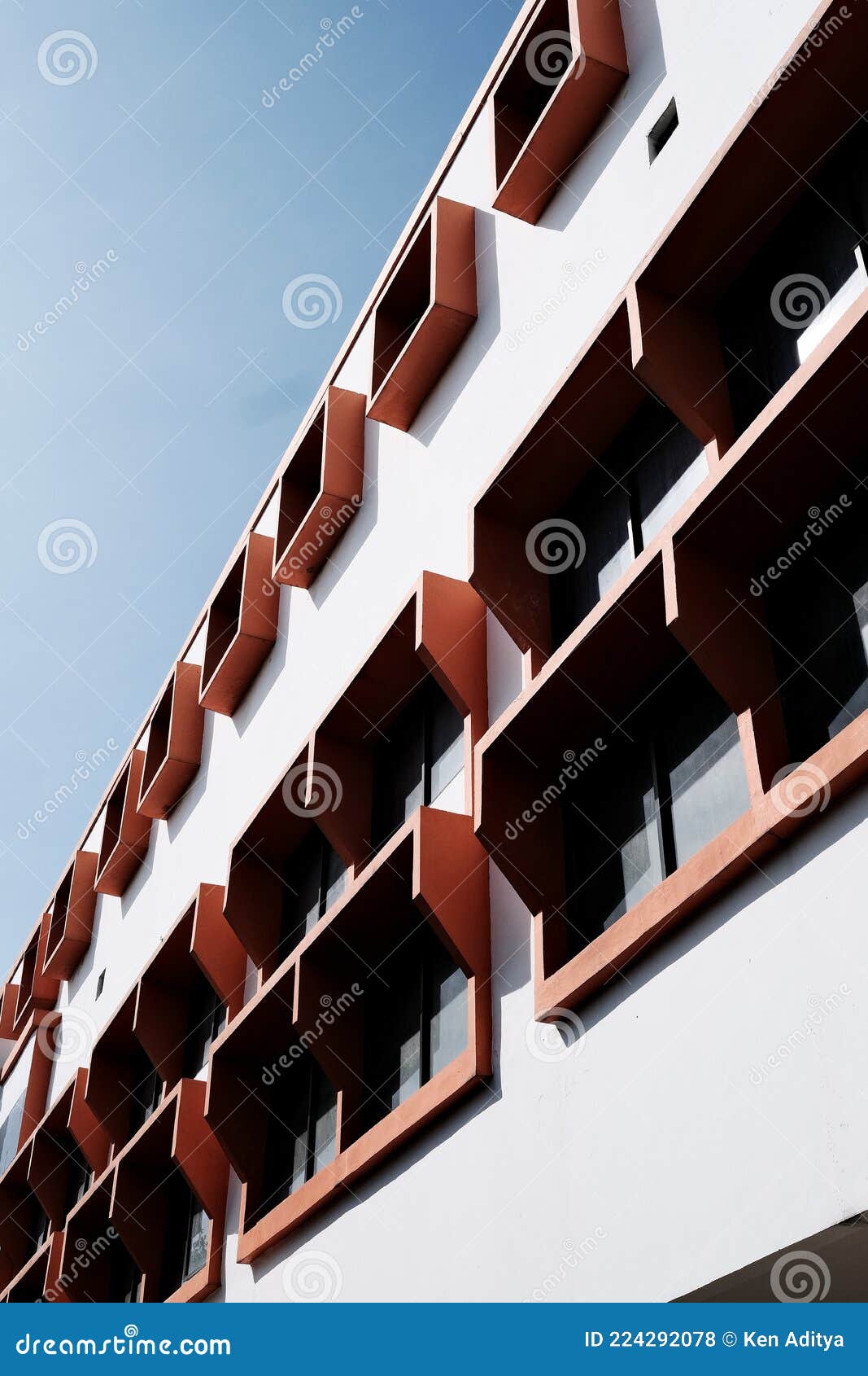 A Building with Orange Windows Frame Makes Diagonal Line Stock Photo ...