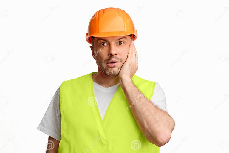 Confused Construction Worker Touching Face Posing Over White Studio ...
