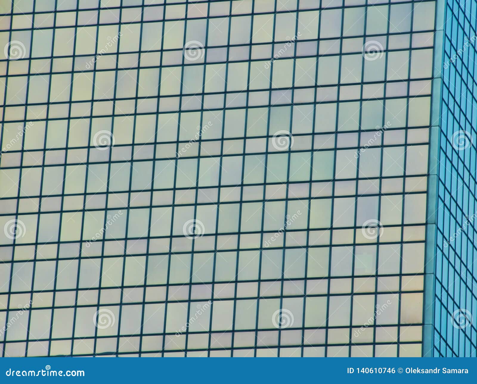 A Building of Rectangular Glass Windows with Reflections Stock Photo ...