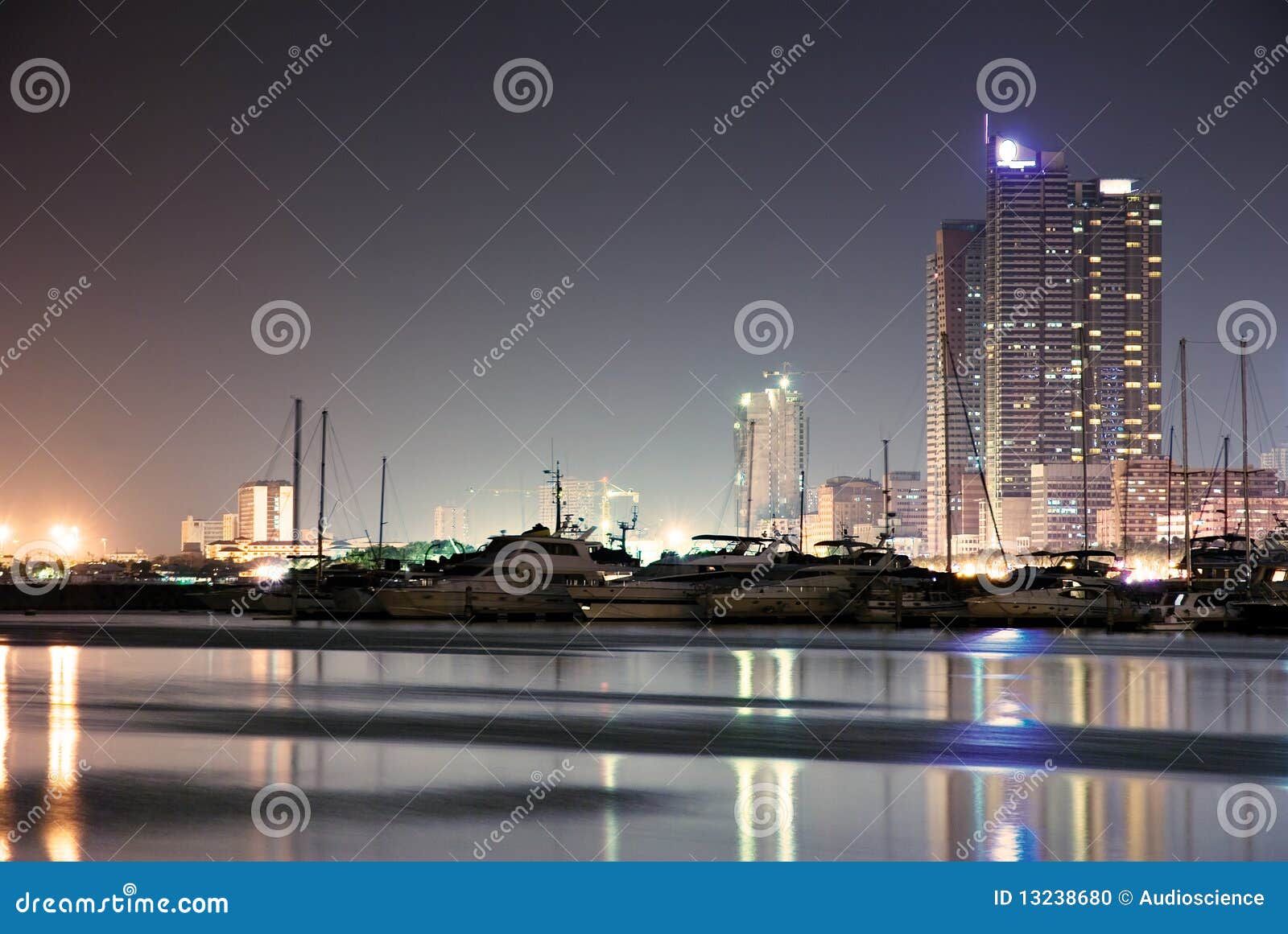 Building Reflections at Night Stock Photo - Image of coast, manila ...