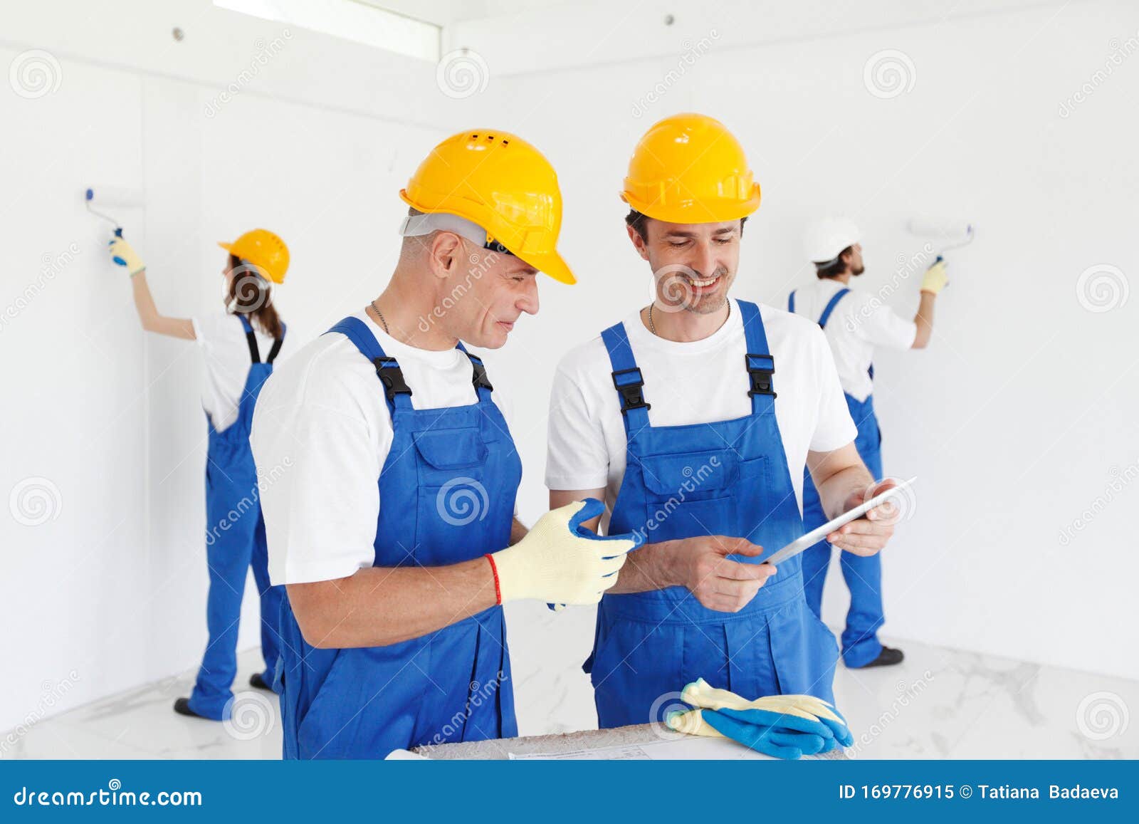 Renovation workers team stock image. Image of paint - 169776915