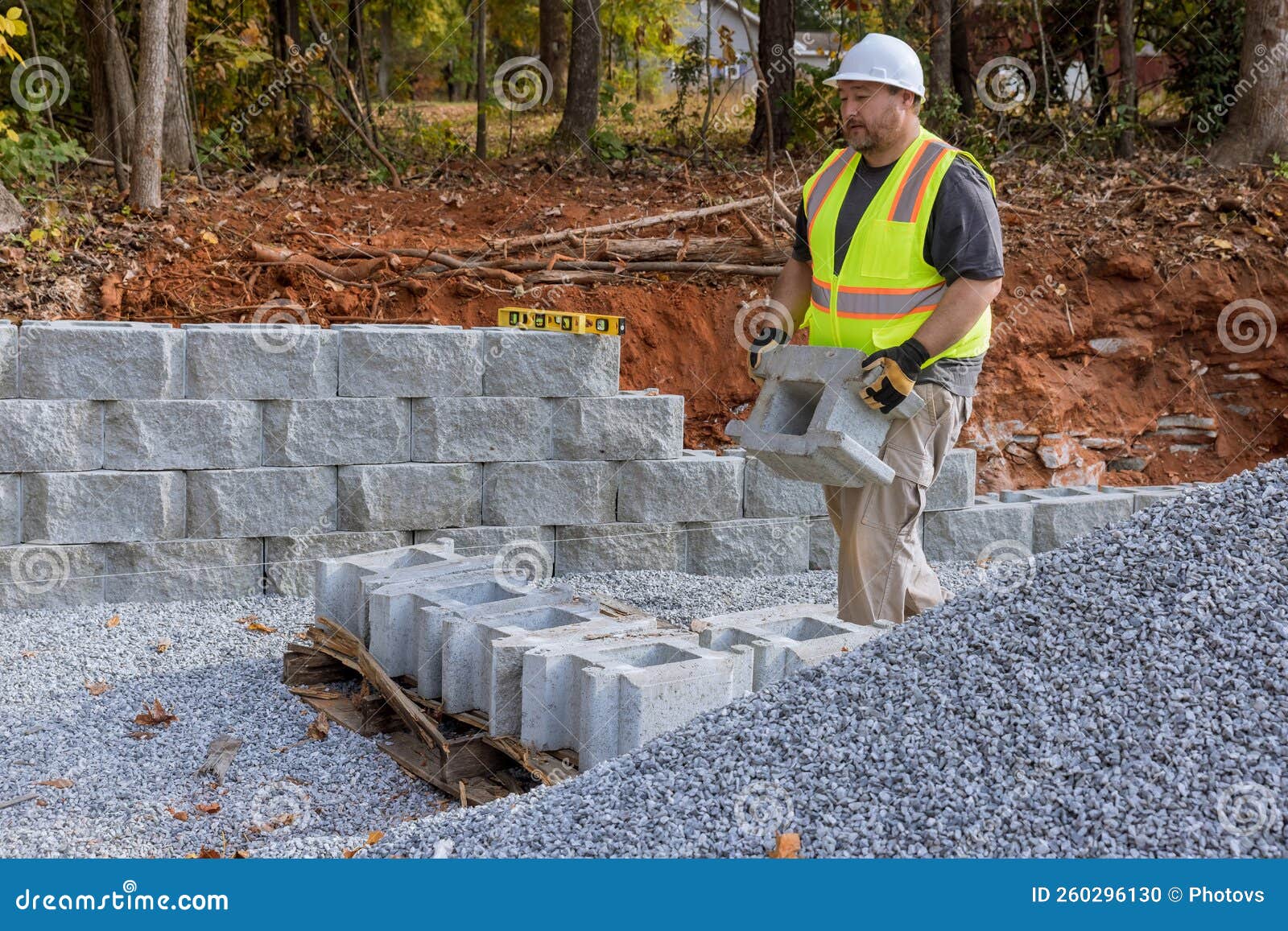 Building a Retaining Wall with Retaining Blocks on the New Property is ...
