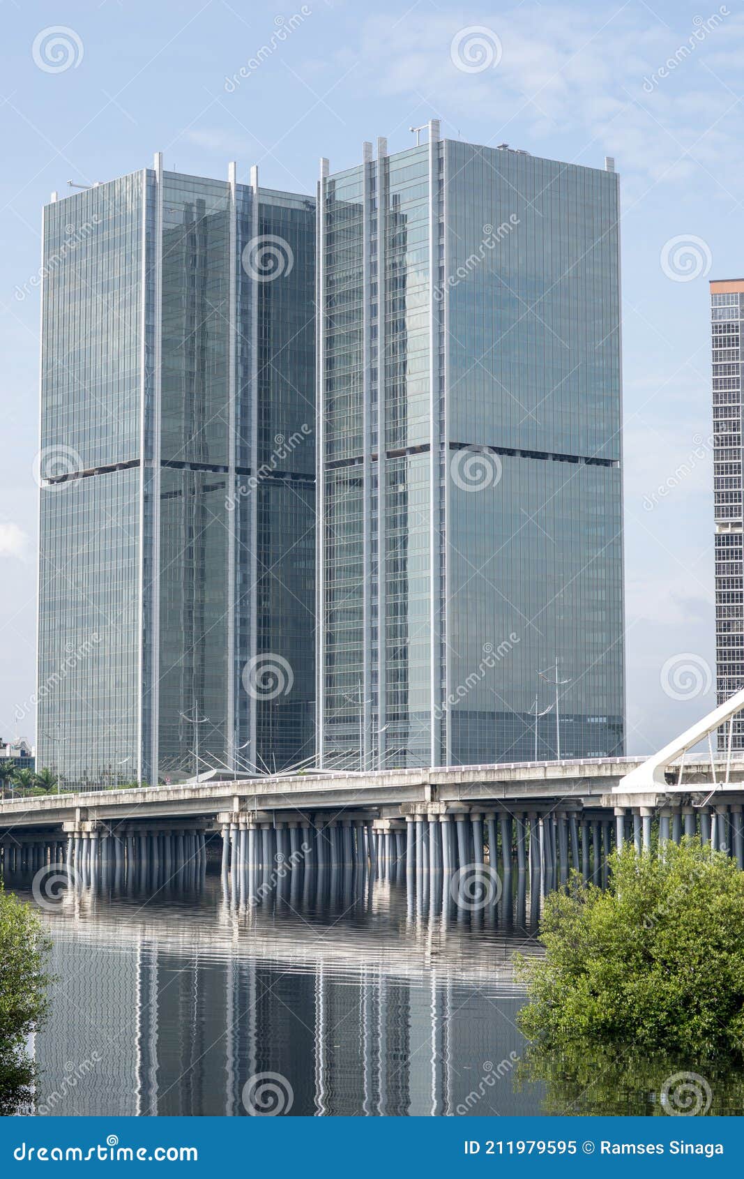 Building by the River with Bridge on the Stock Image - Image of ...