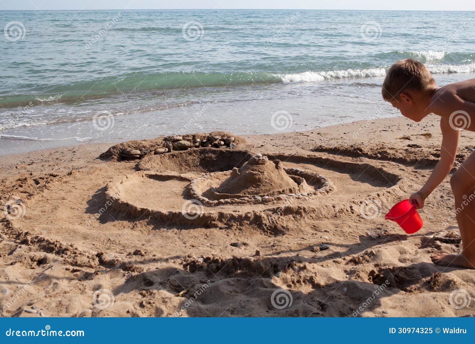Building sand castle stock image. Image of coastline - 30974325