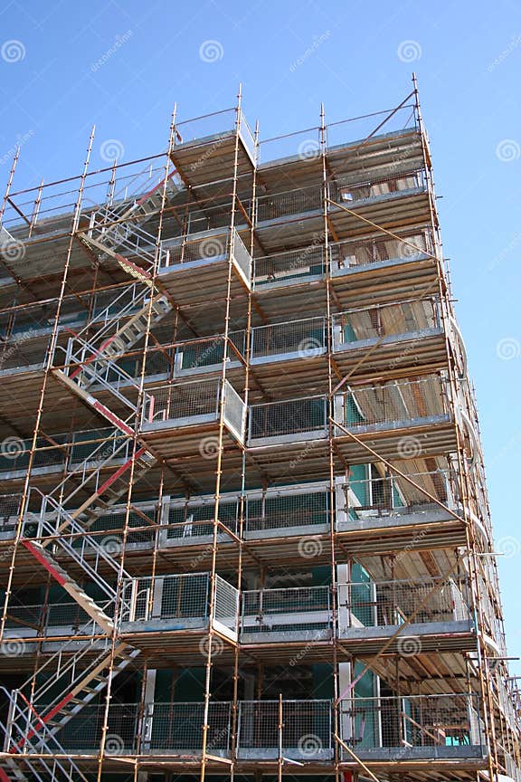 Building with scaffolding stock photo. Image of multiple - 2409516