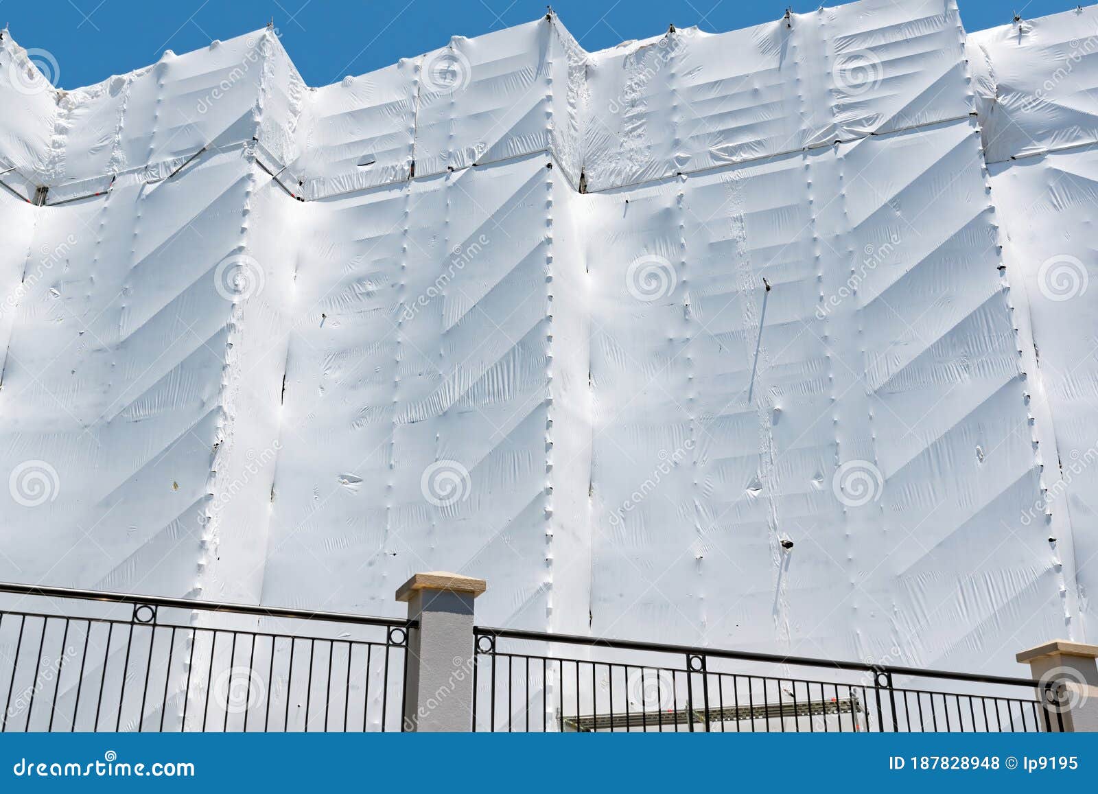 Building with Scaffolding Covered with White Scaffold Mesh Stock Photo ...