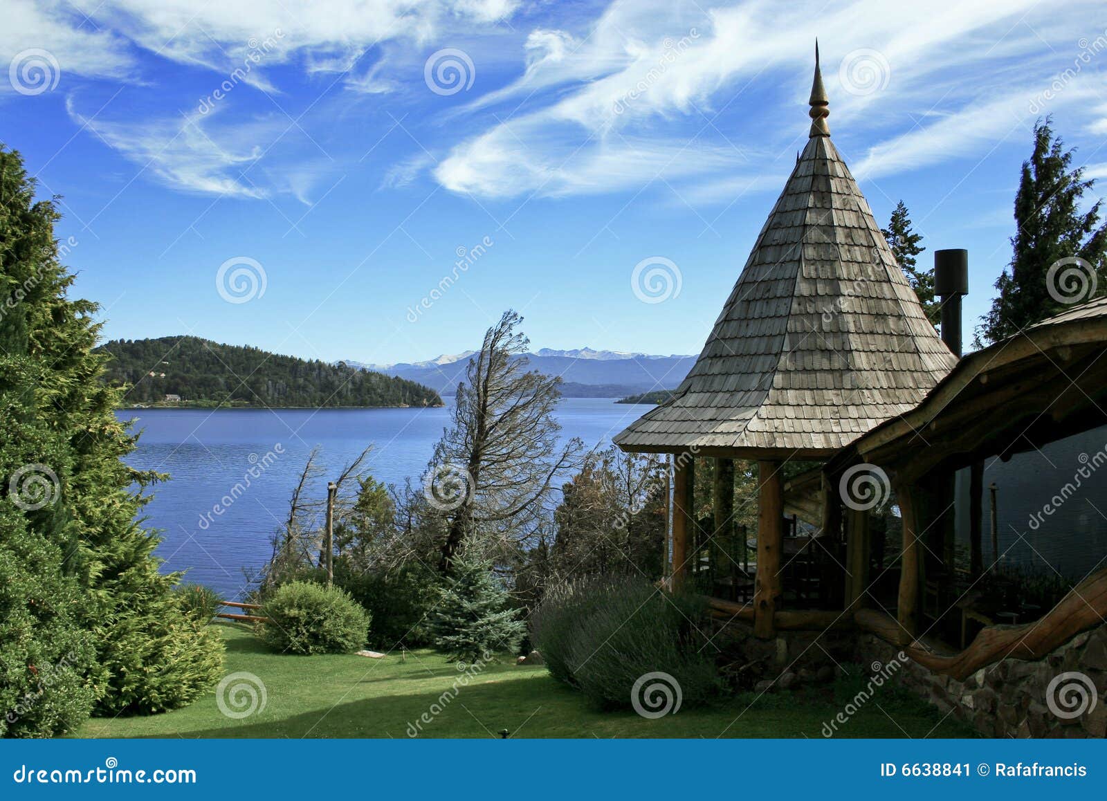 Building on scenic lake stock image. Image of lake, mountain - 6638841