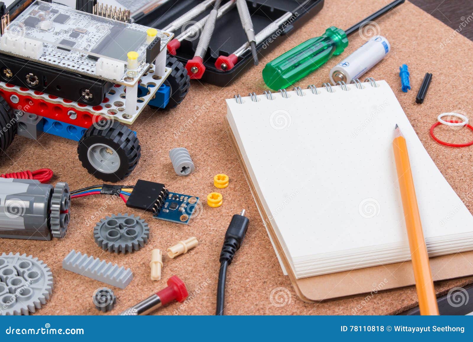 Building a Simple Car Robot with Microcontroller and Notebook. Stock ...