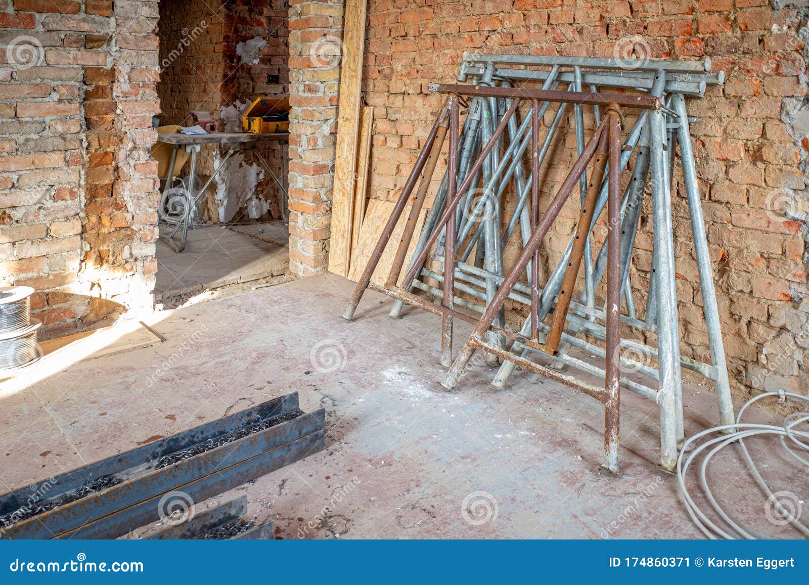 A Building Site, 2 Scaffolding Trestles Lean Against a Brick Wall Stock ...