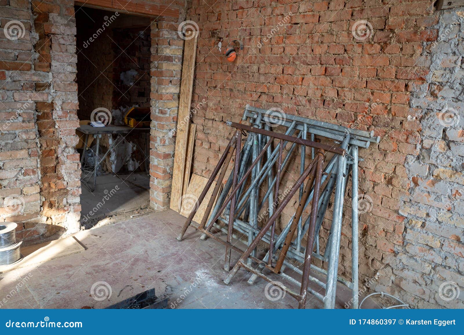 A Building Site, 2 Scaffolding Trestles Lean Against a Brick Wall Stock ...