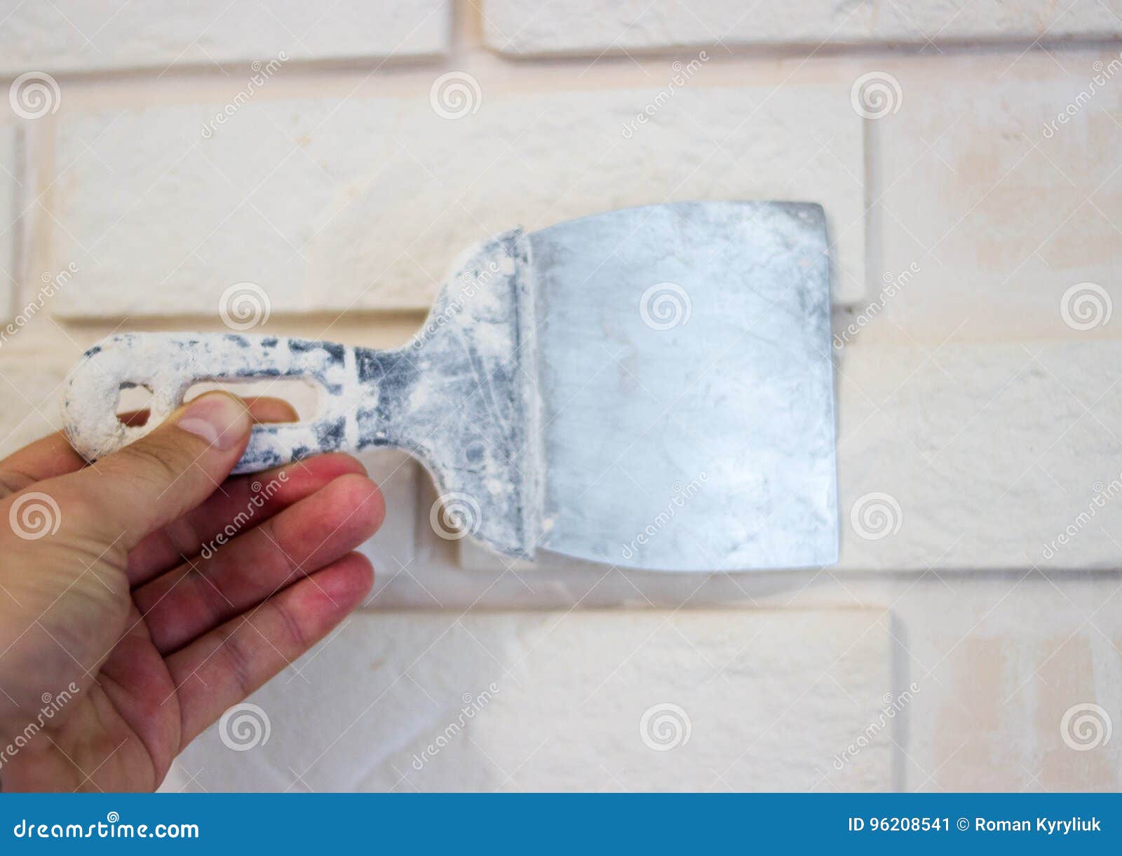 Building spatula in hand stock image. Image of professional - 96208541