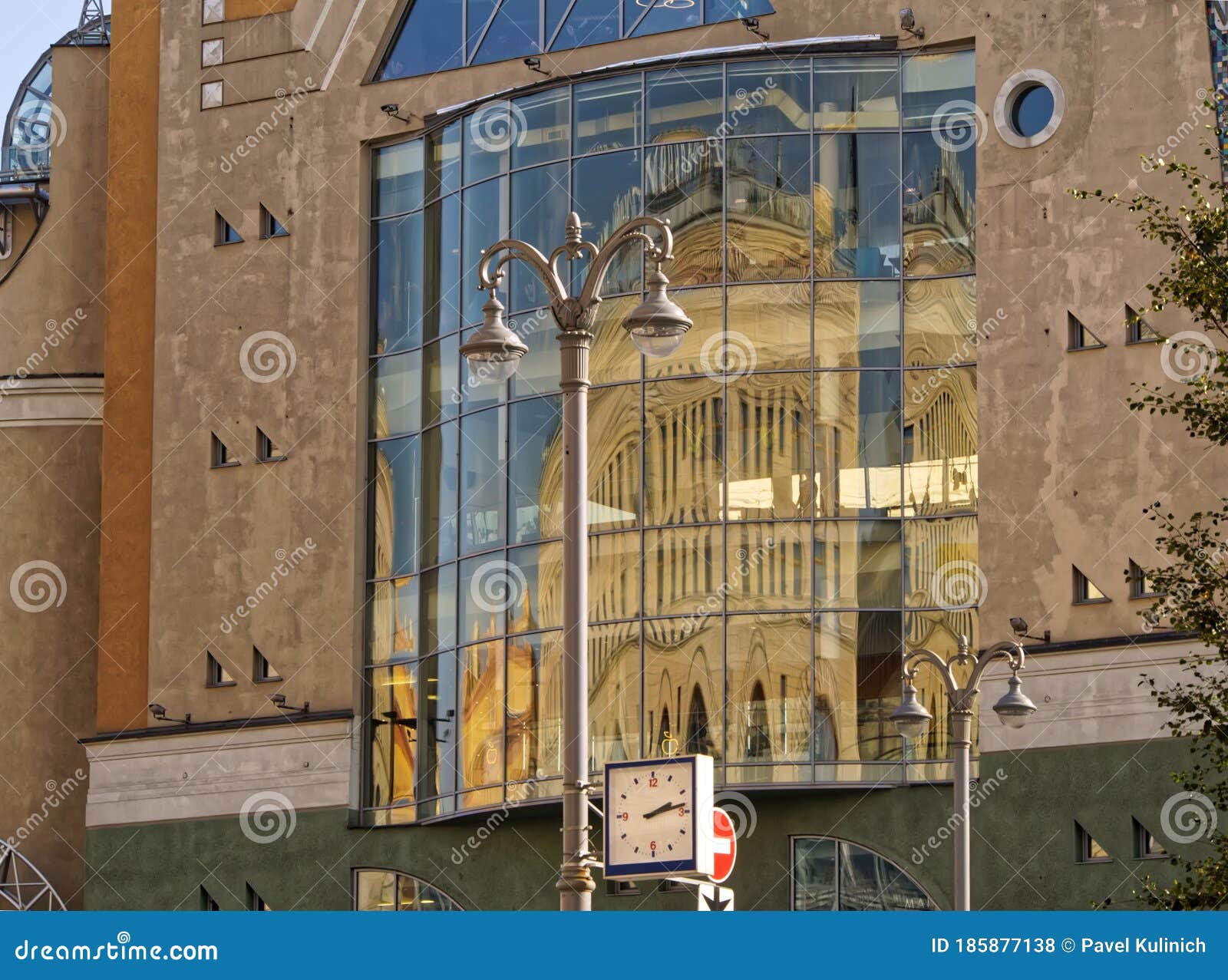 A Building on a Street and a Distorted Reflection of the Opposite ...