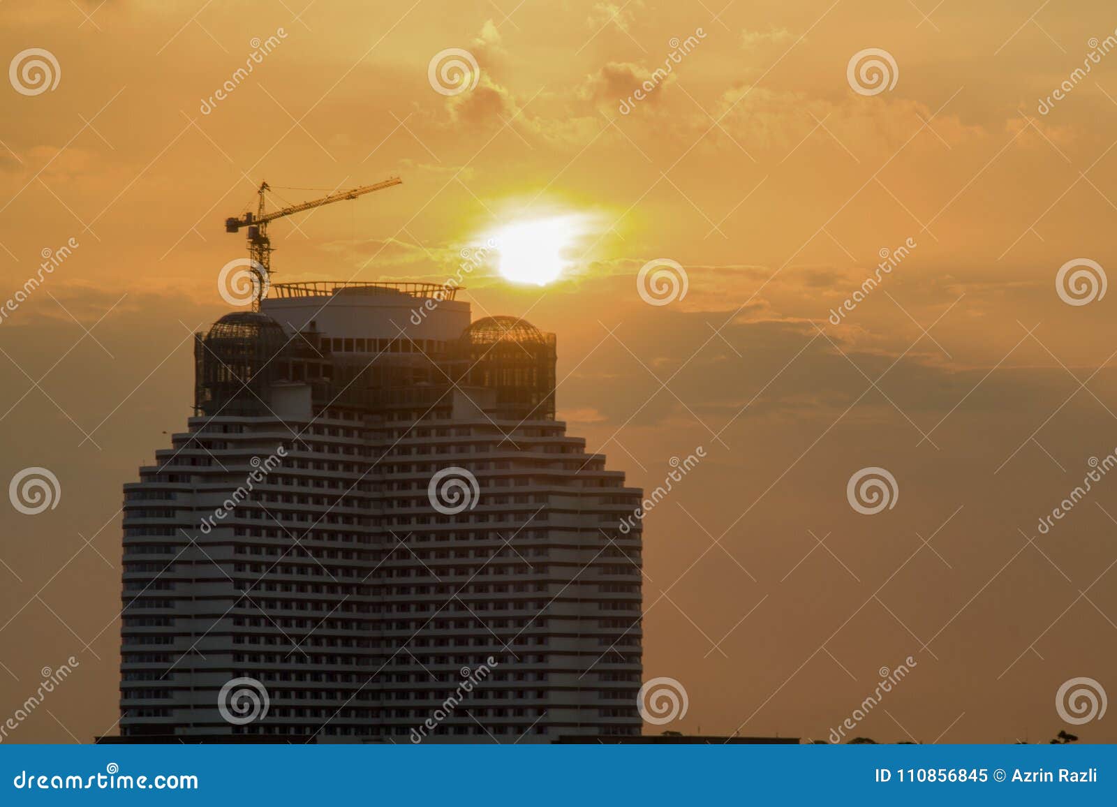 Building and sunset stock image. Image of scenery, sunset - 110856845