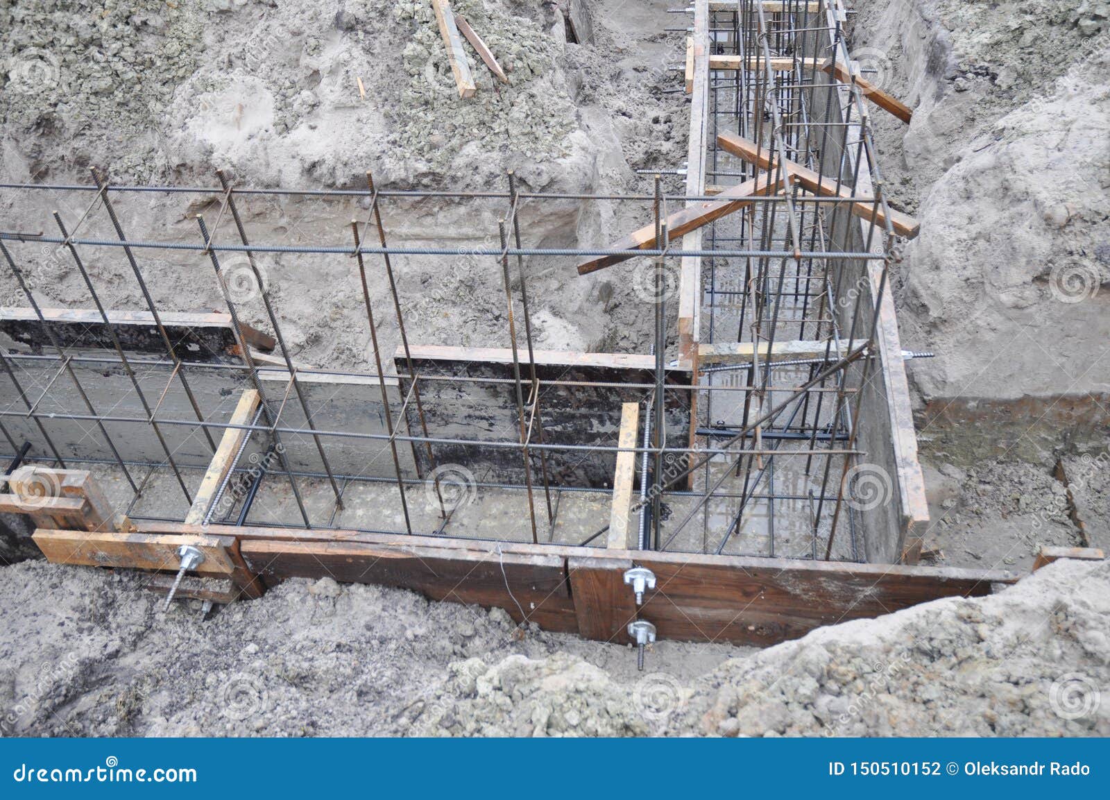 Building T-Shaped Concrete House Foundation with Slabs and Iron Bars ...