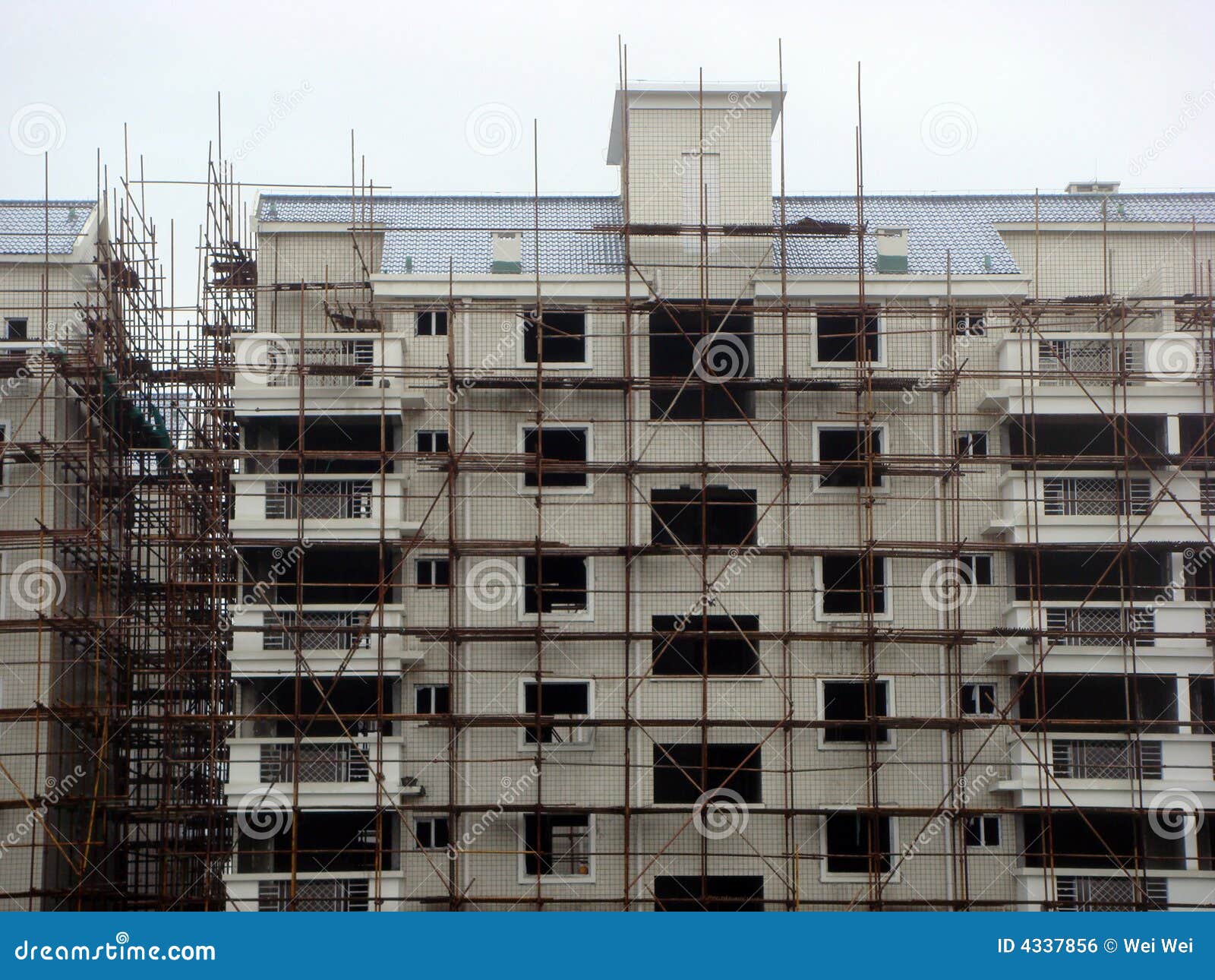 Building Under Construction Stock Photo - Image of housing, scaffold ...