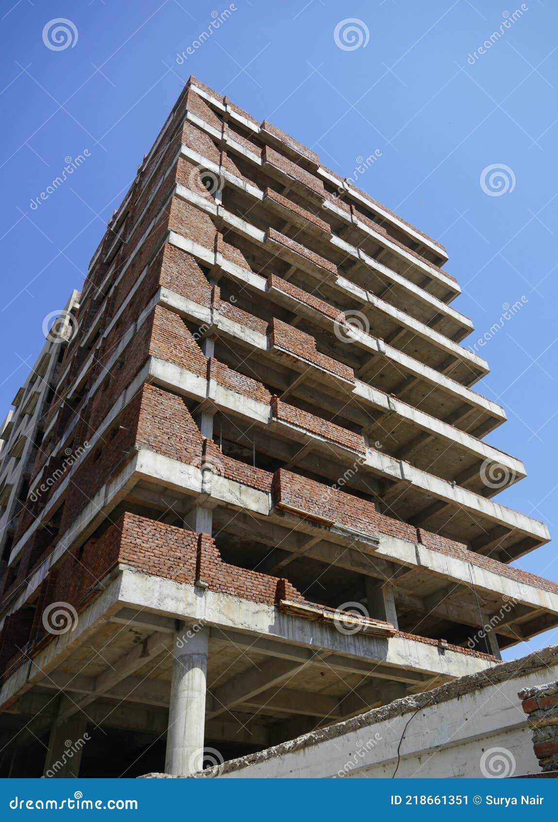 Building Under Construction Against Blue Sky. General View of the ...