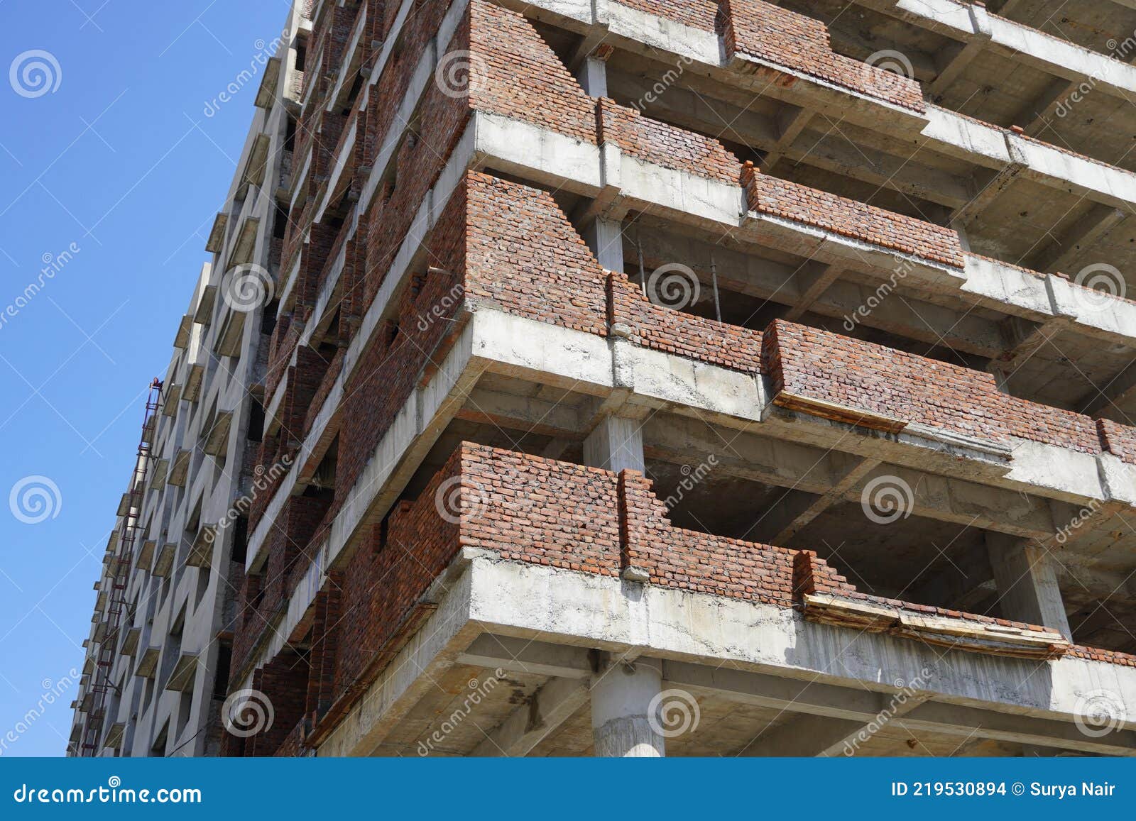 Building Under Construction Against Blue Sky. General View of the ...