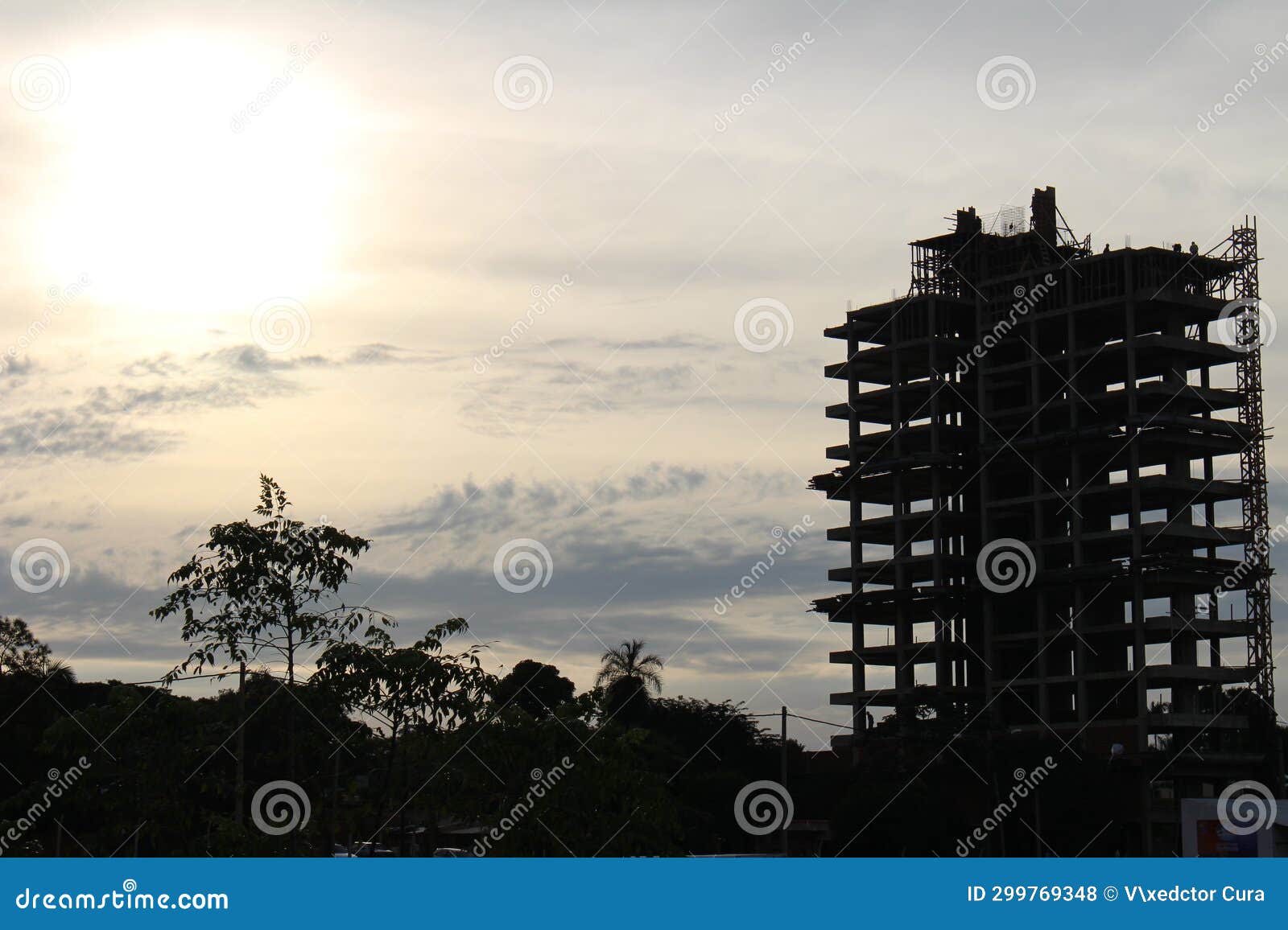 Building Under Construction and Sunset in the Background Stock Photo ...