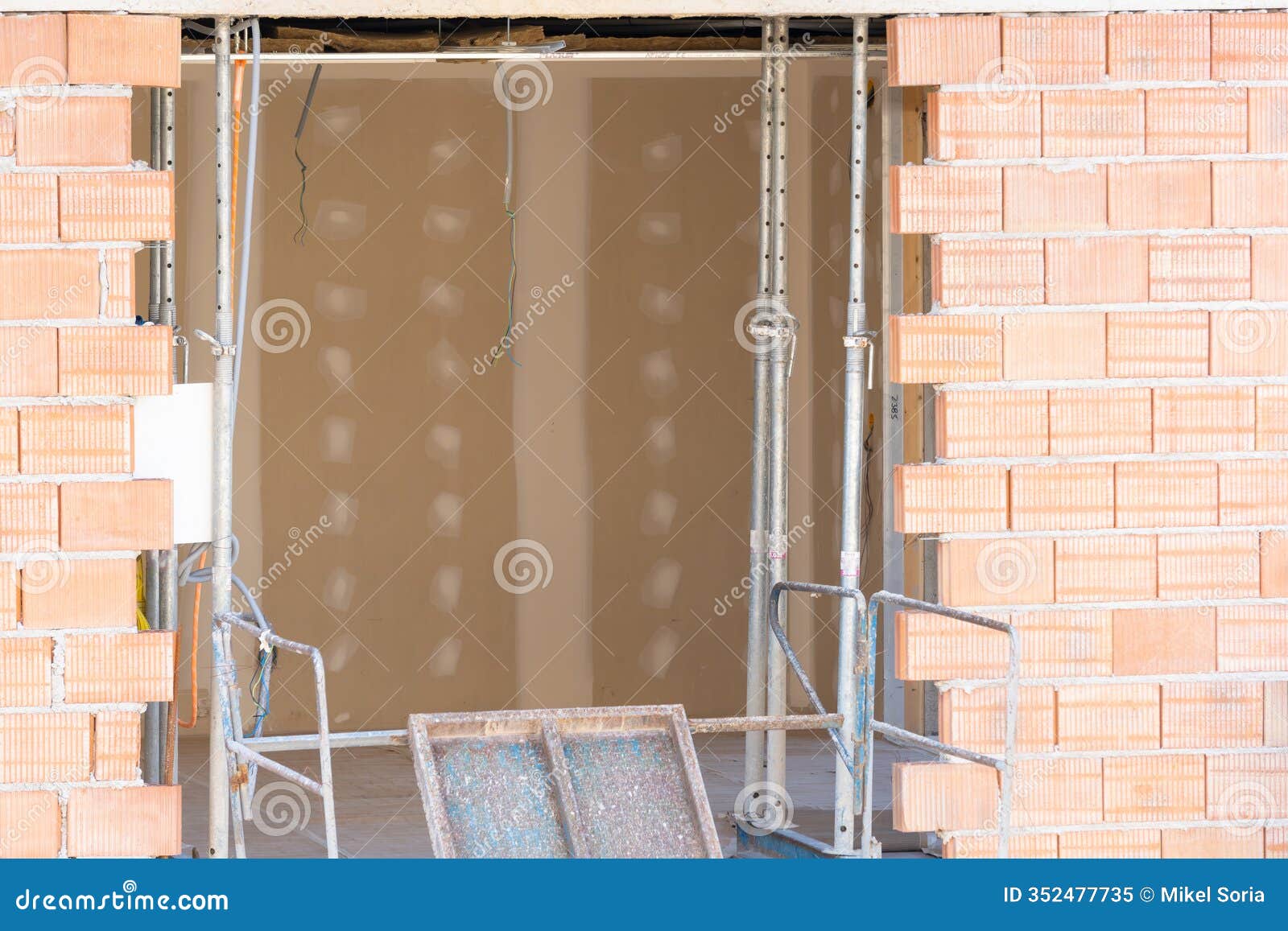 Building Under Construction Brick Wall and Interiors with Half-finished ...