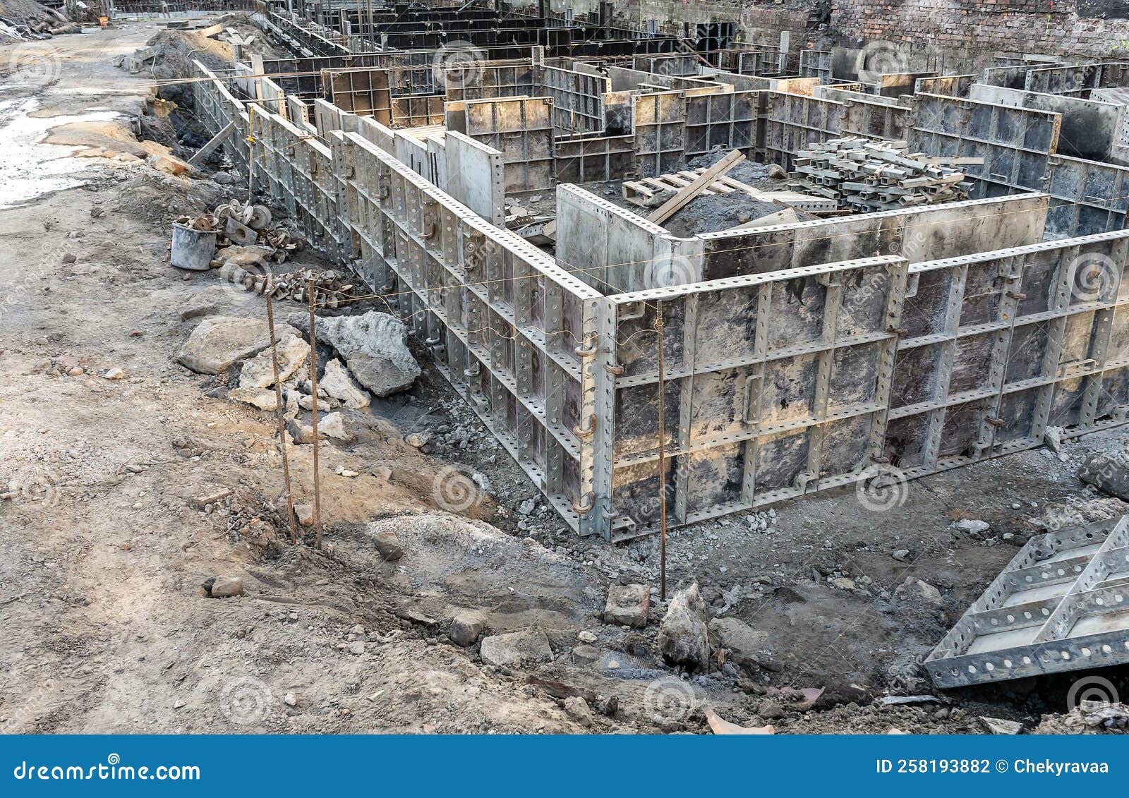 Building Under Construction. Construction Site Against Blue Sky ...