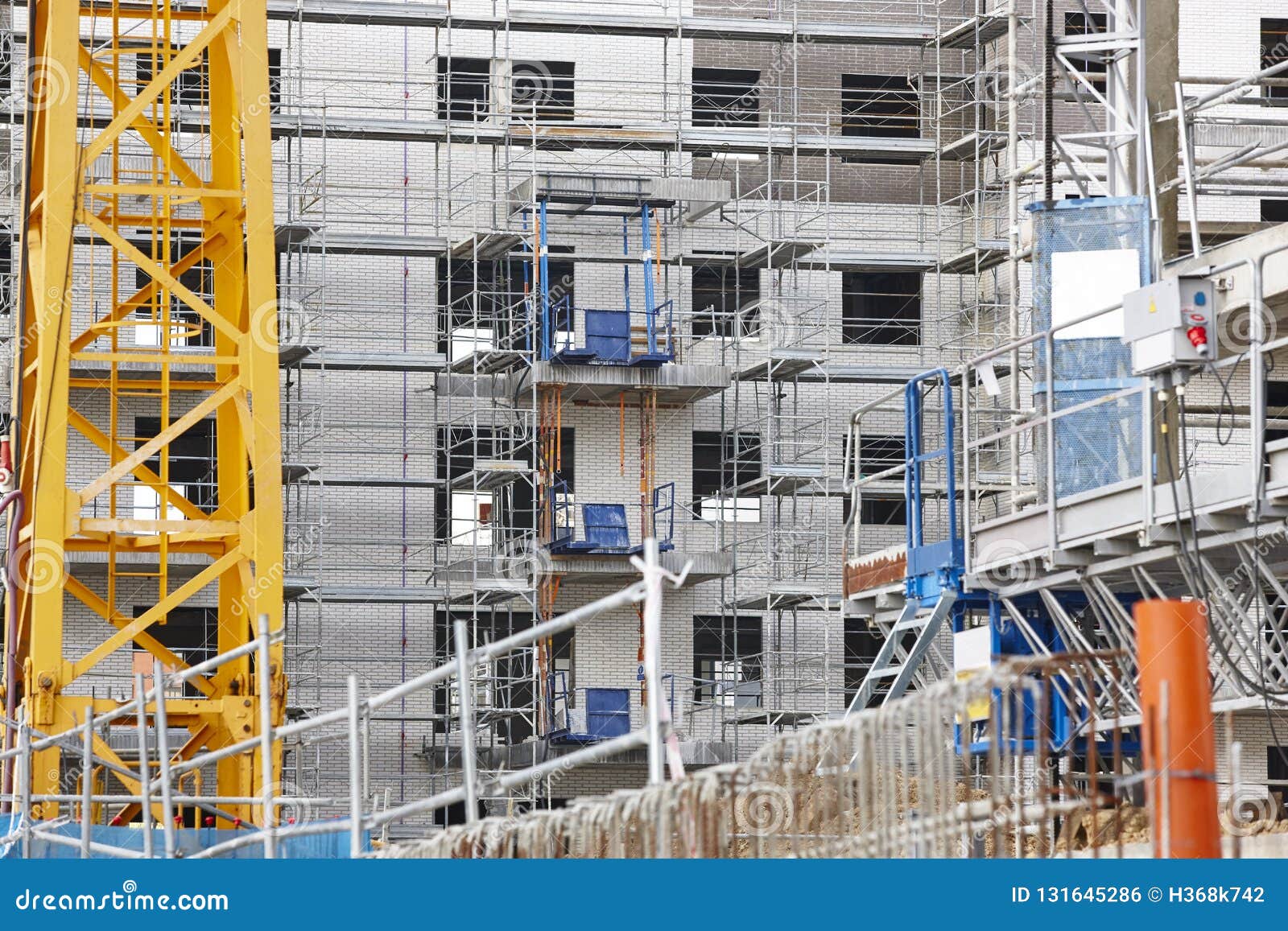Building Under Construction. Crane Machinery Structure Stock Photo ...