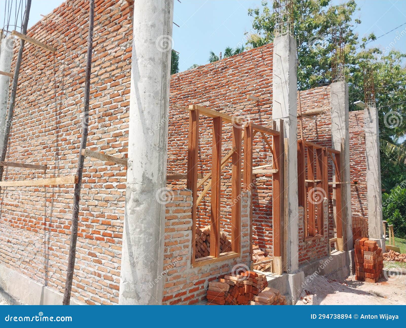Building Under Construction. Installation Brick at Construction Site ...