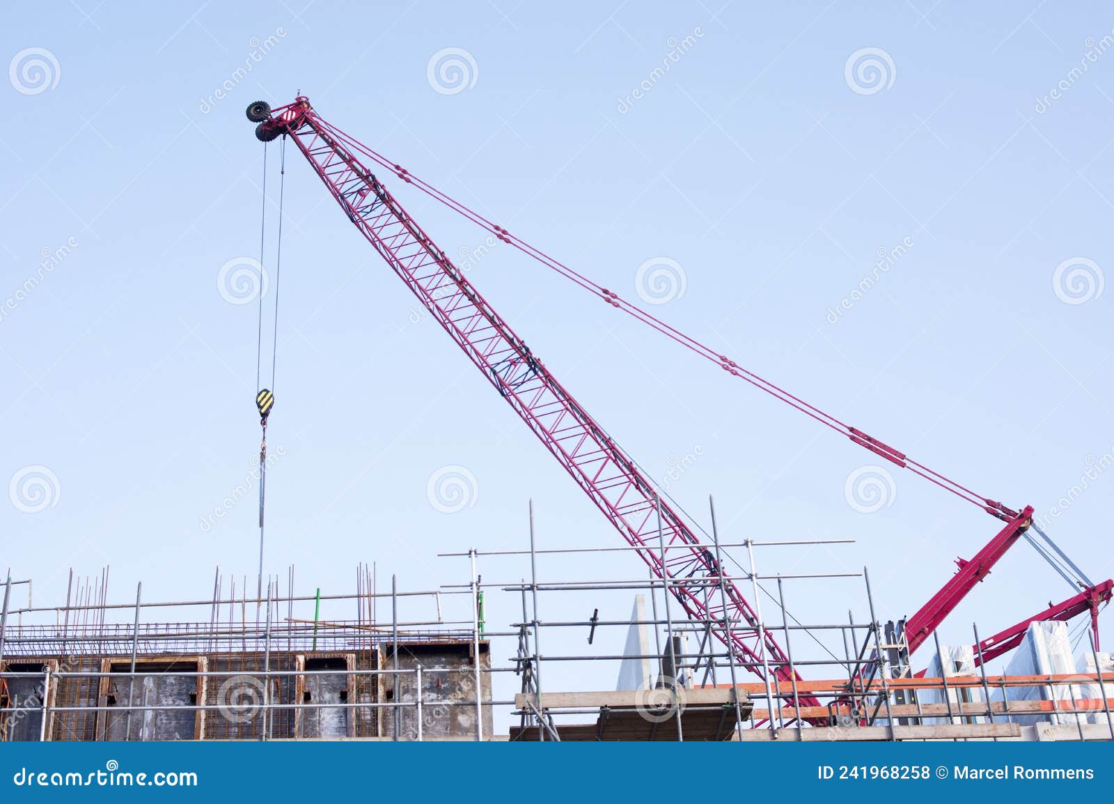 Building Under Construction with Red Crane Stock Photo - Image of ...