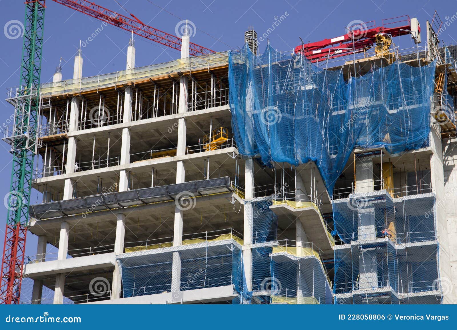 Building Under Construction with Scaffolding in the Foreground Stock ...