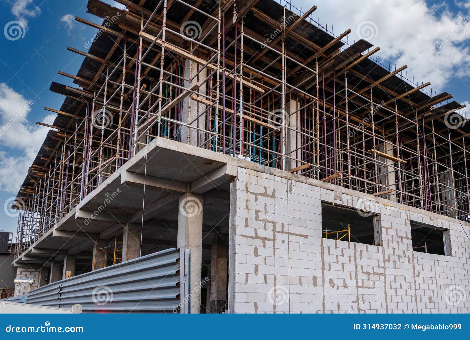 A Building Under Construction with Scaffolding and Formwork for the 3rd ...