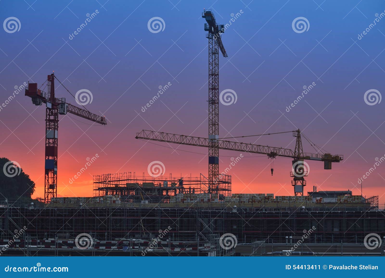 Building Under Construction at Sunset. Night Scenes Stock Image - Image ...