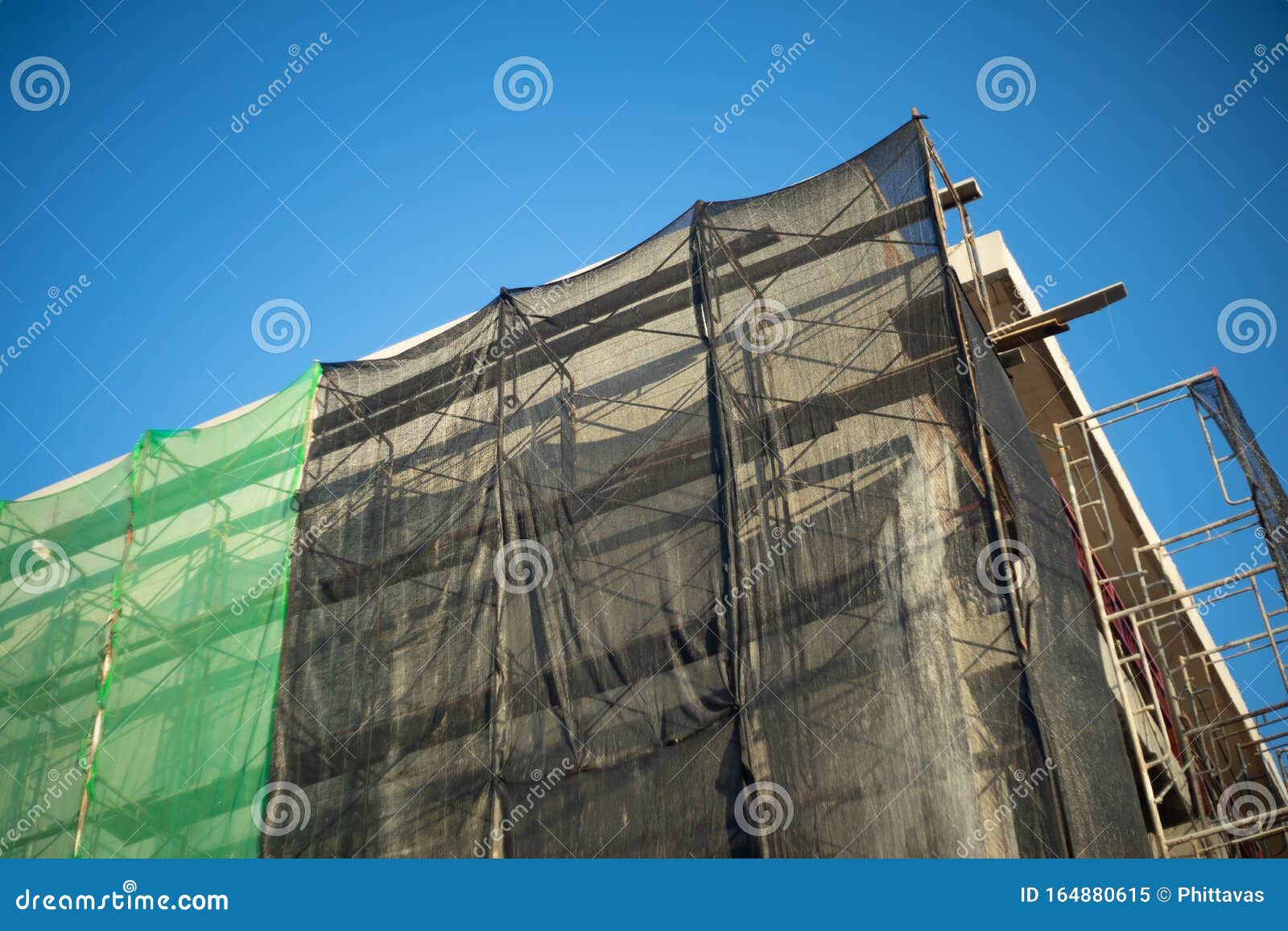 Building between Under Construction Use Shading Net Cover Scaffolding ...