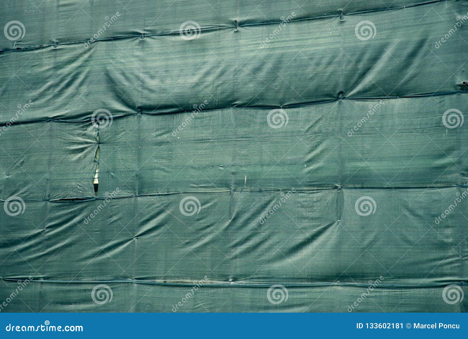 Building Under Construction Wrapped in Safety Nets Stock Image - Image ...