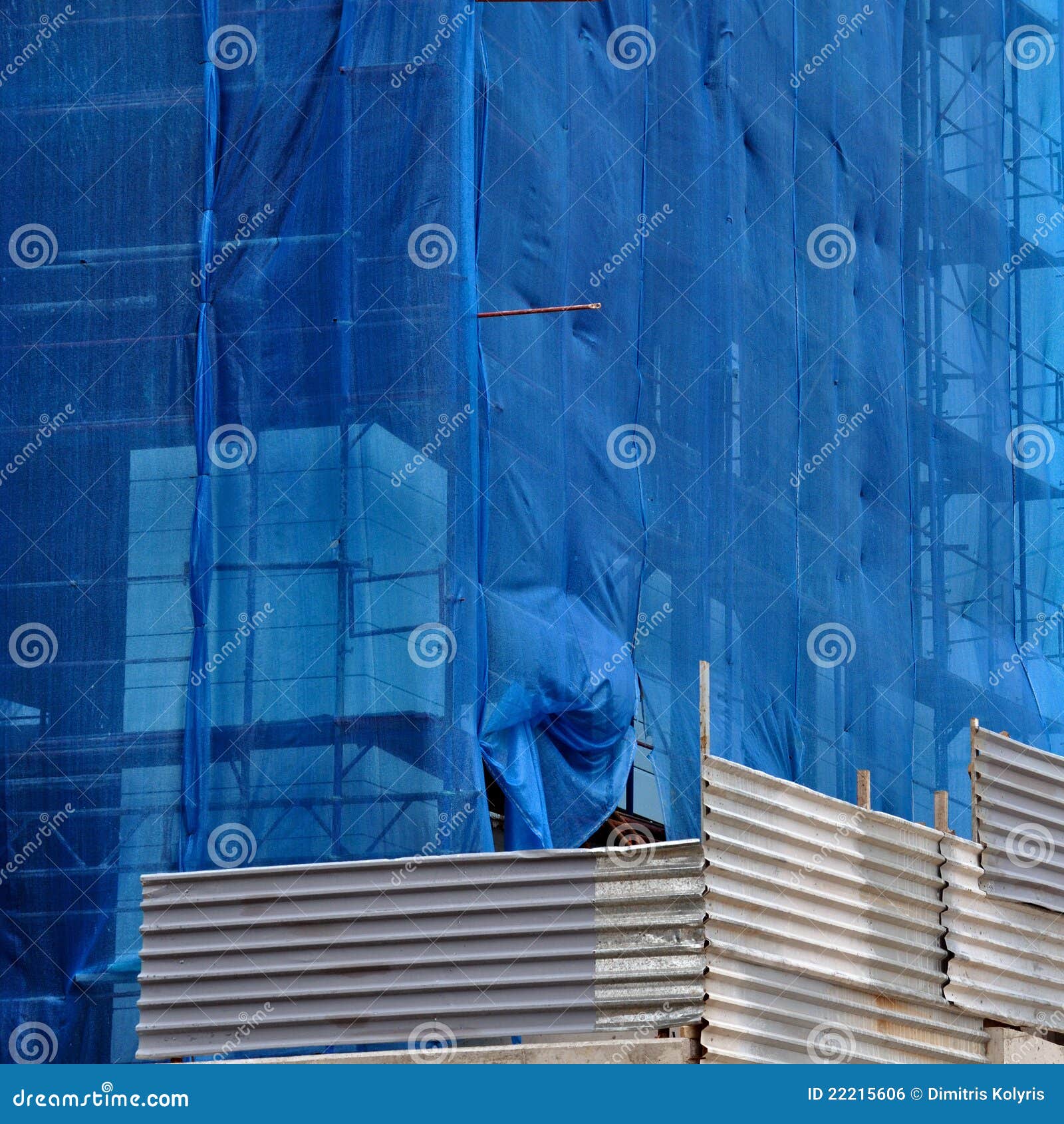 Building Under Debris Netting at Construction Site Stock Photo - Image ...