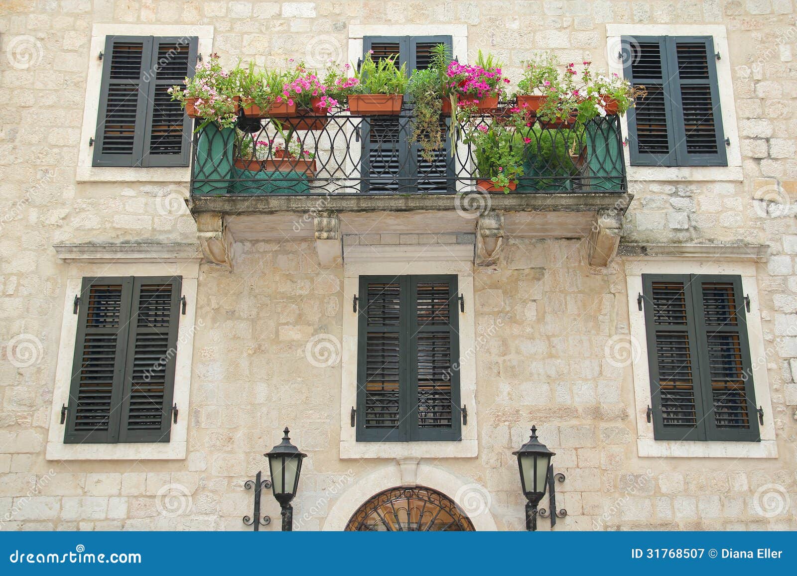 Building with Vintage Balcony and Shuttered Windows Stock Image - Image ...